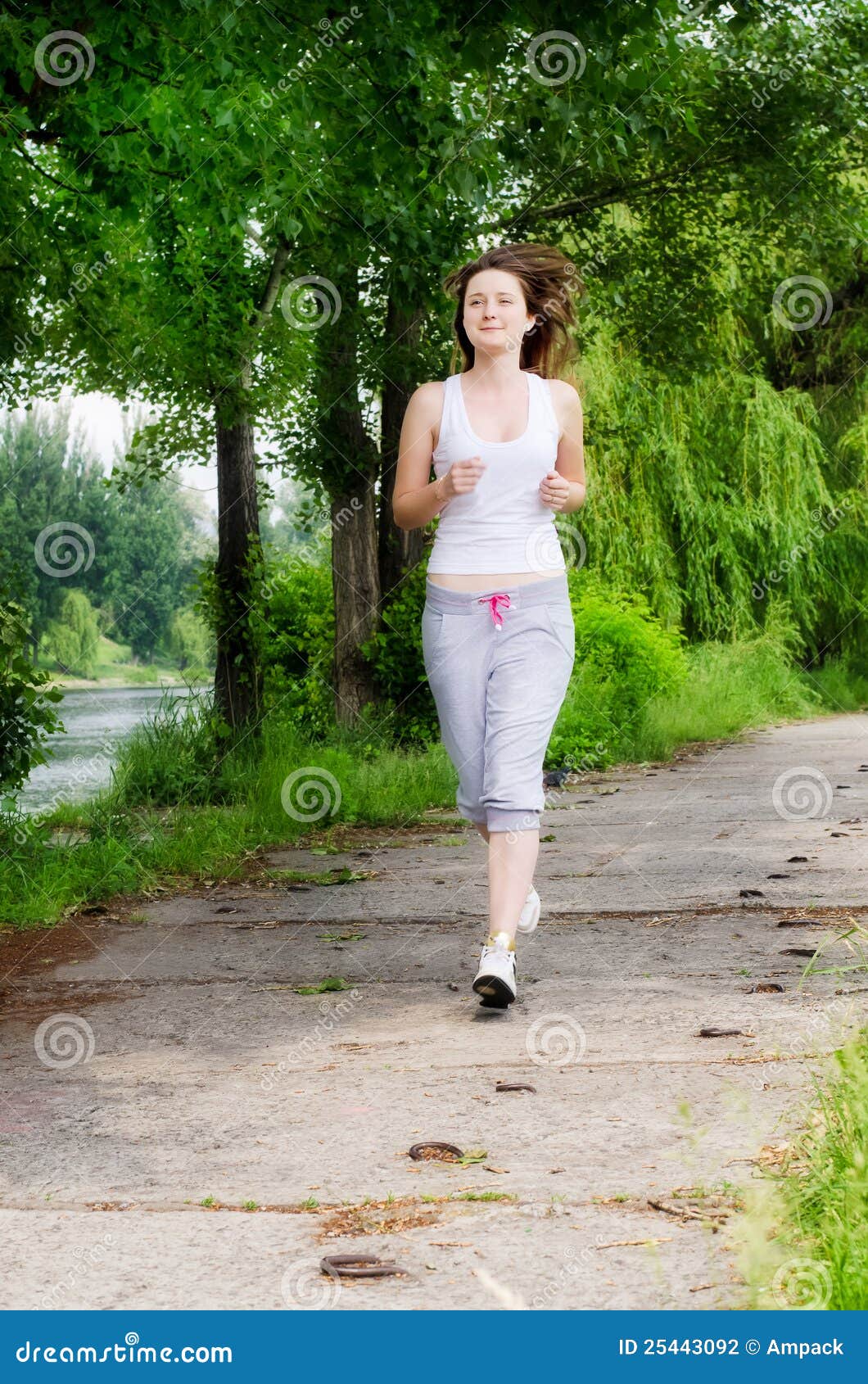 Girl Jogging through a Park Stock Photo - Image of healthy, exercise ...