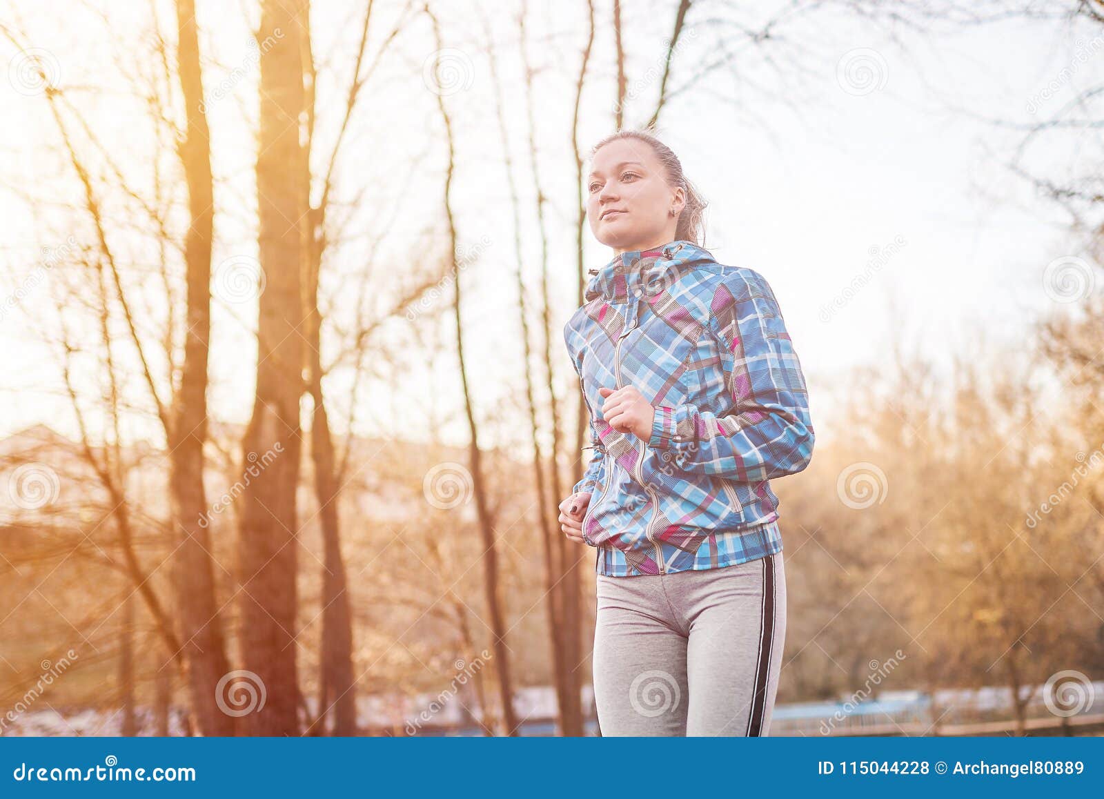 Girl Jogging in the Park stock photo. Image of person - 115044228