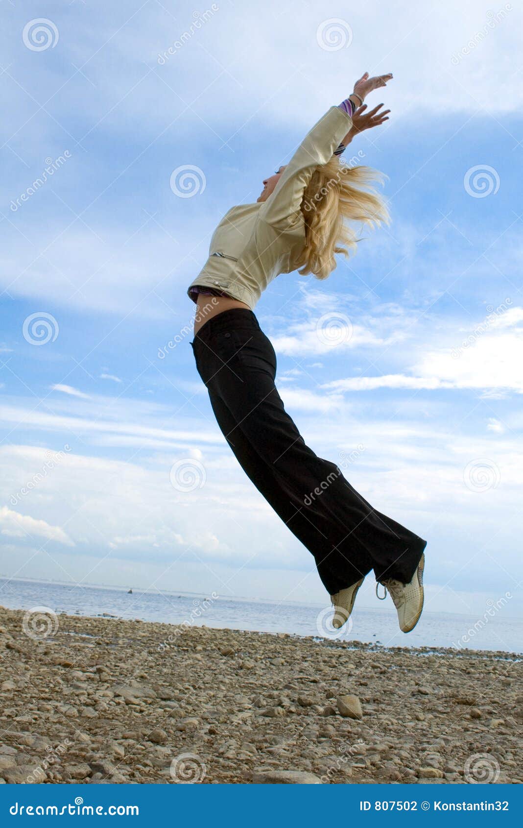 Girl jump above Baltic sea stock photo. Image of lady, athletic - 807502