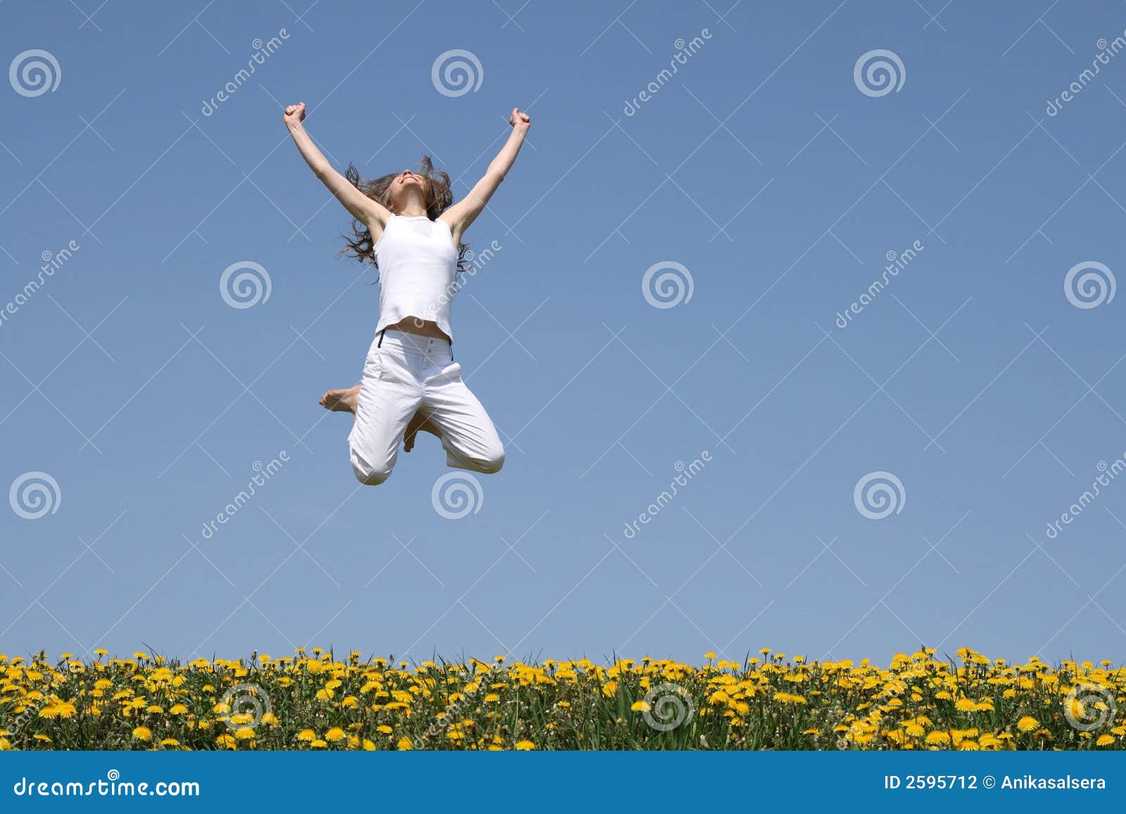 Girl in a jump, looking up stock photo. Image of copy - 2595712