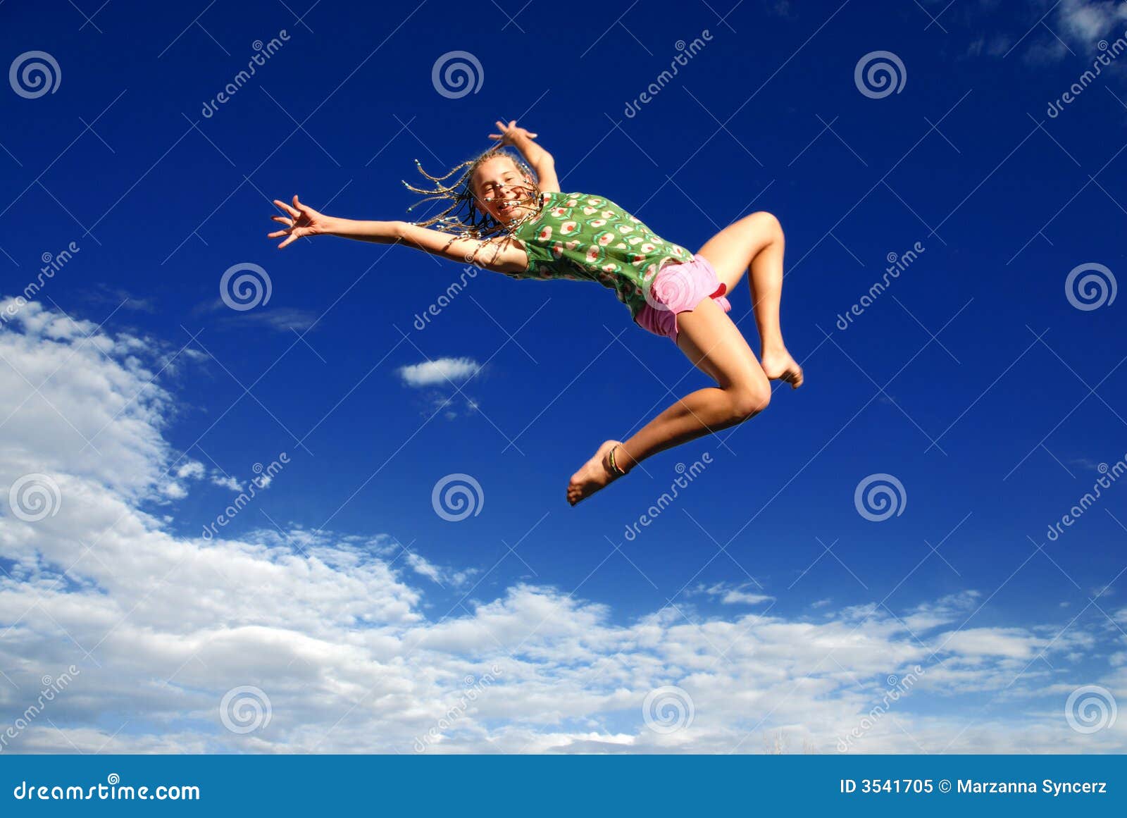 Girl jumping stock image. Image of leap, athlete, clouds - 3541705