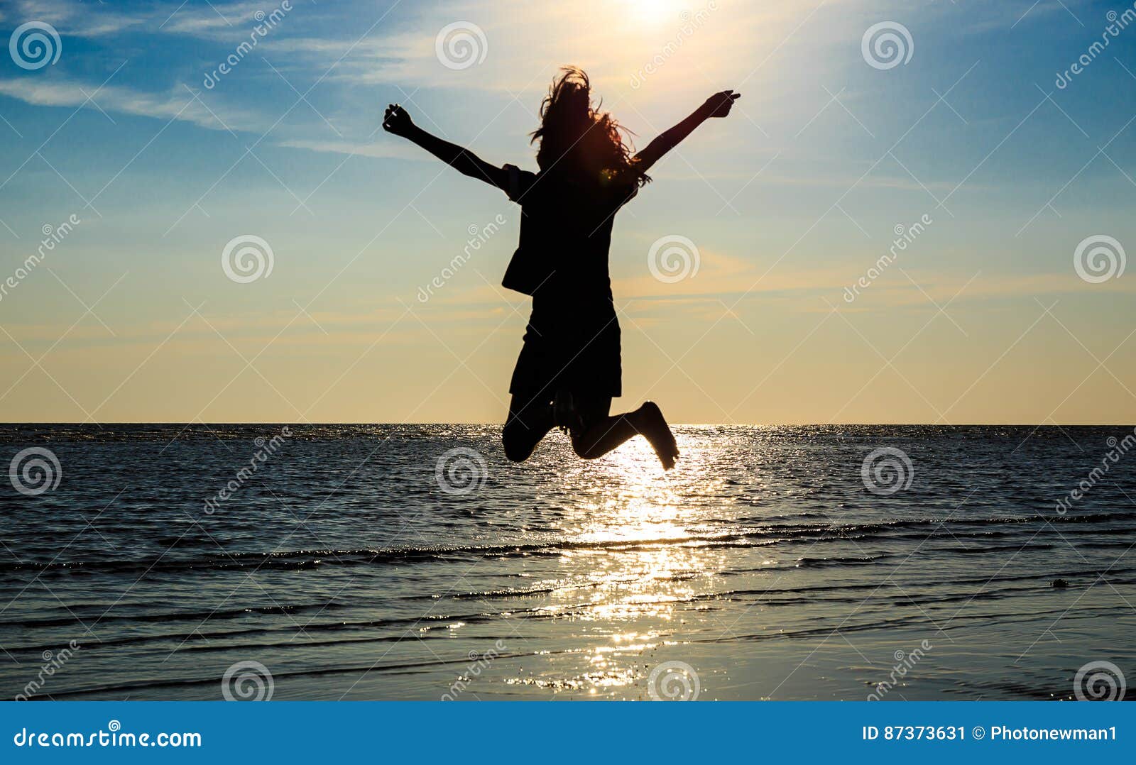 Girl Jumping on the Beach with the Sun. Stock Image - Image of woman ...