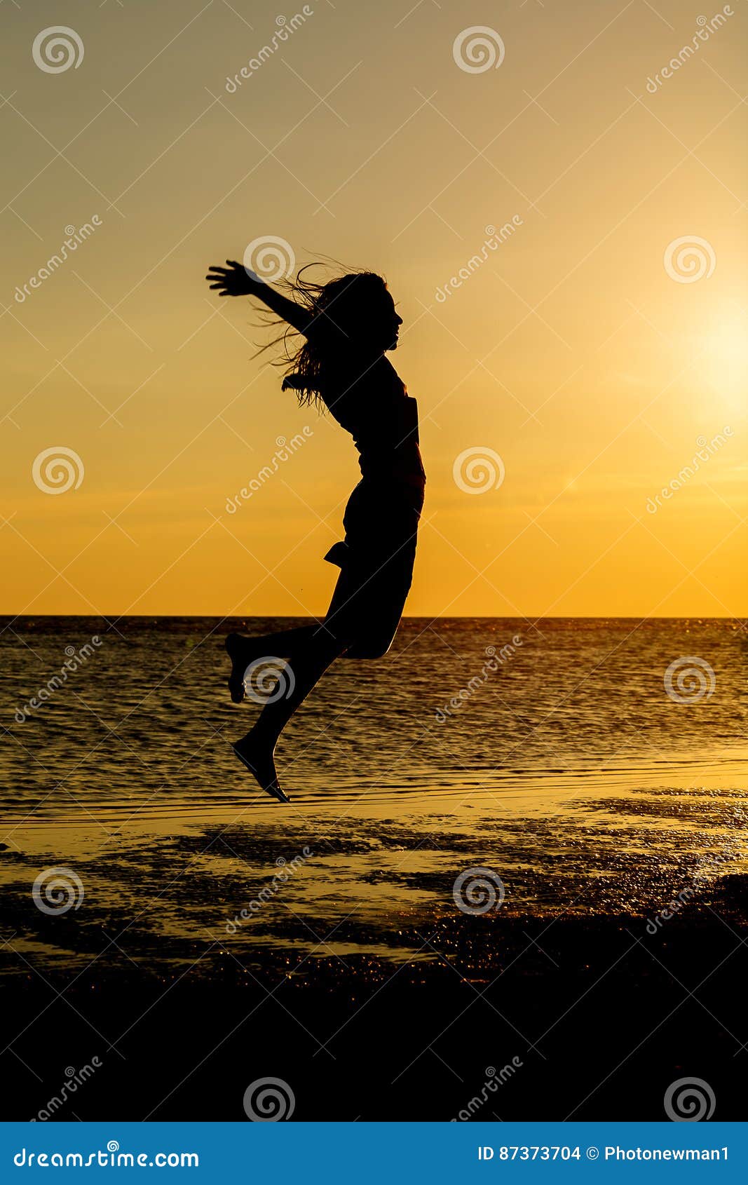 Girl Jumping on the Beach with the Sun. Stock Photo - Image of woman ...