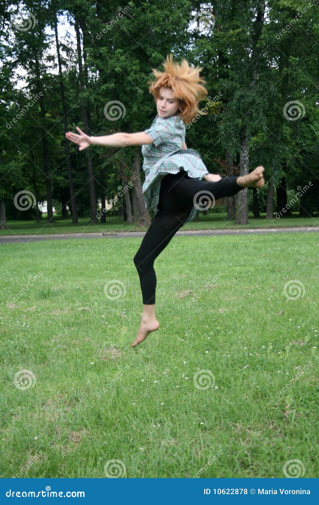 Girl jumping on grass stock photo. Image of arms, hair - 10622878