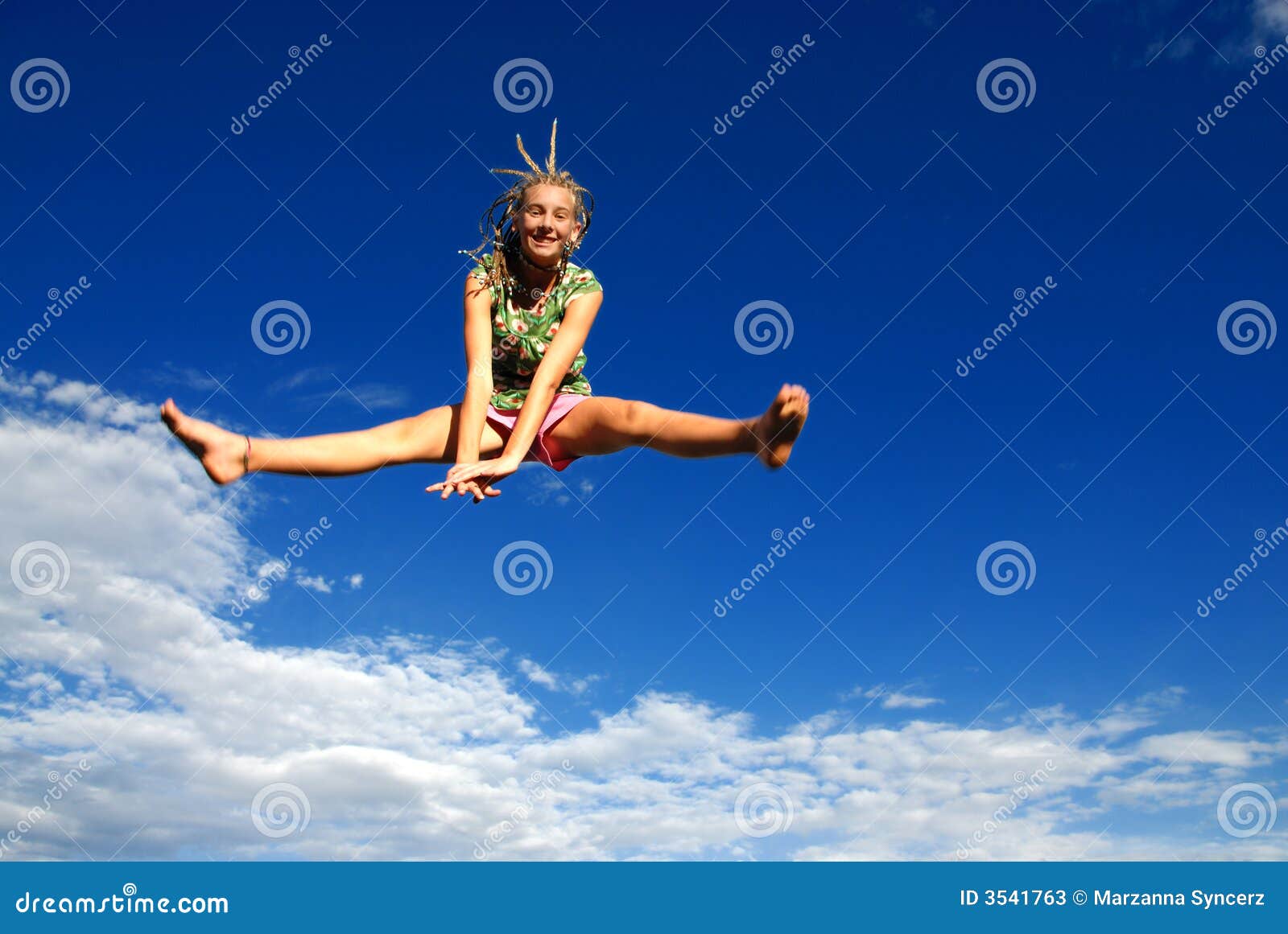 Girl jumping high in air stock image. Image of exaltation - 3541763
