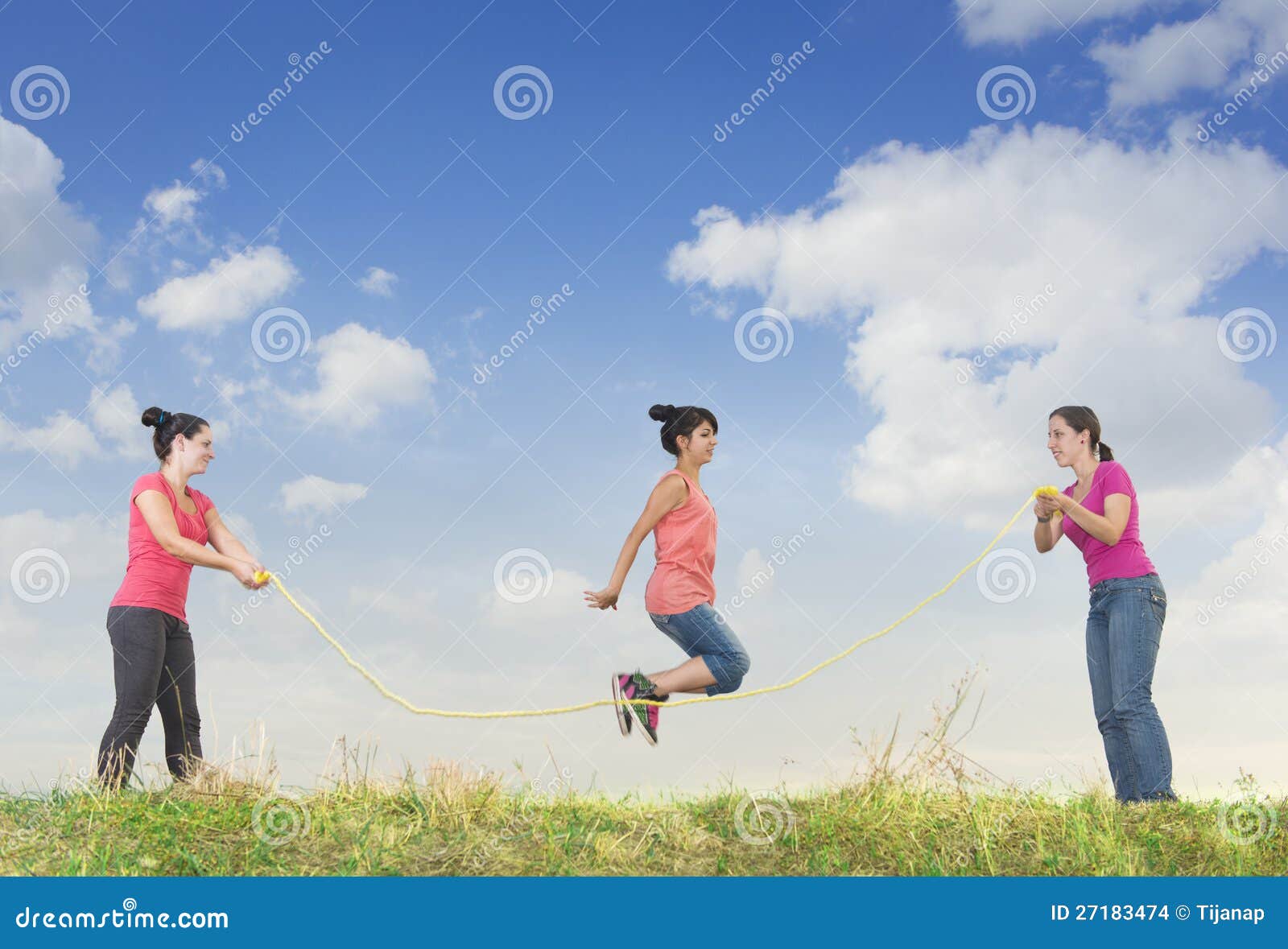 Girl jumping over a rope stock photo. Image of rope, field - 27183474