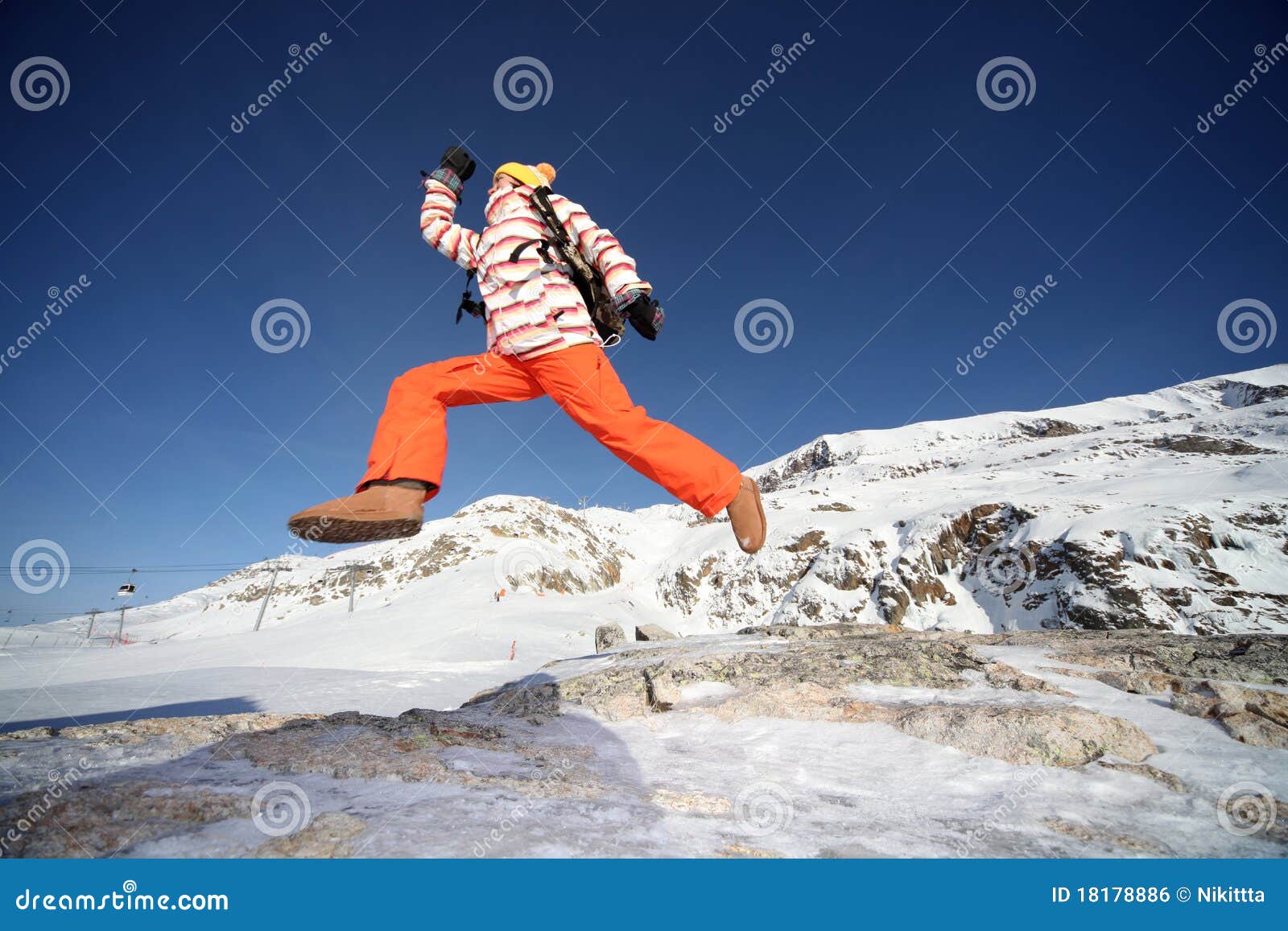 Girl jumping between rocks stock photo. Image of girl - 18178886
