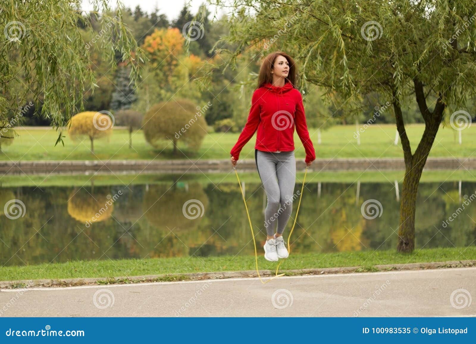 Girl Jumping on the Rope in the Park Stock Image - Image of people ...