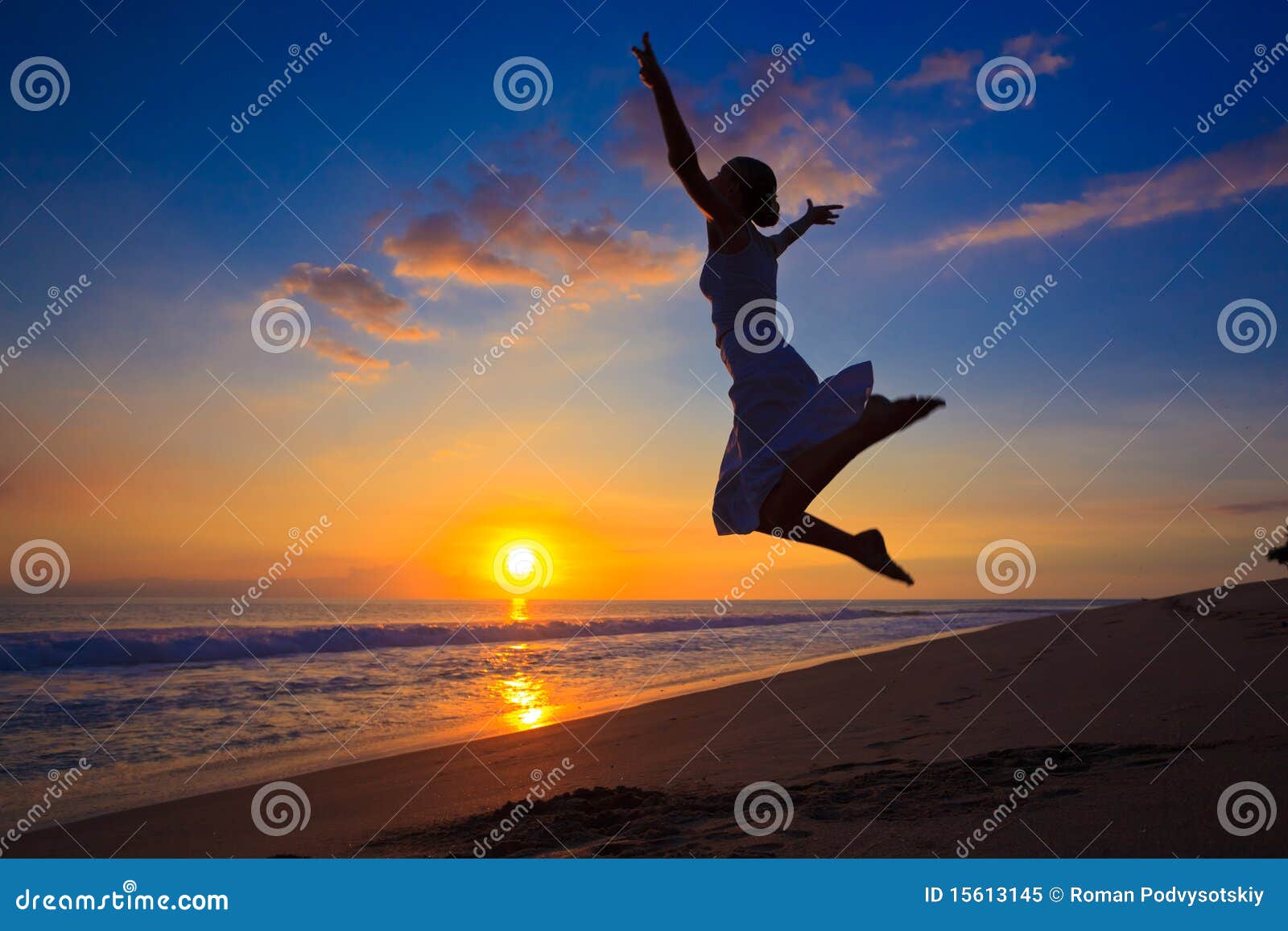 Girl jumping in the sunset stock image. Image of orange - 15613145