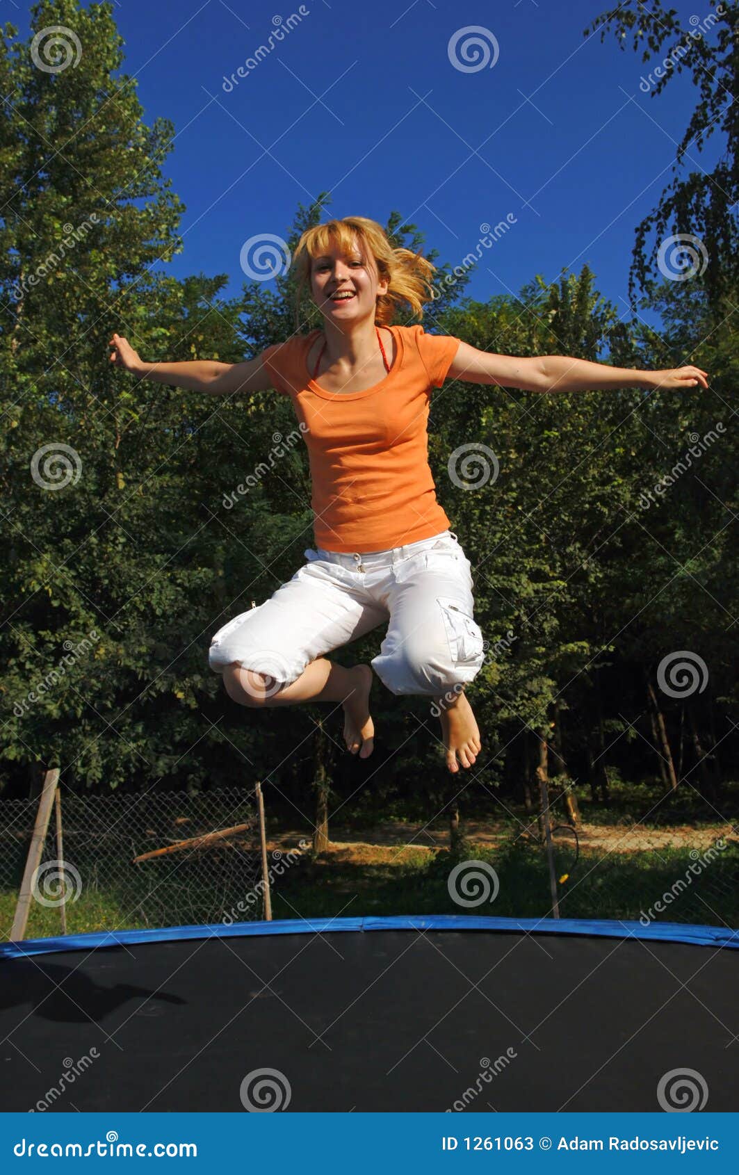 Girl Jumping On Trampoline Stock Image Image Of Blond 1261063