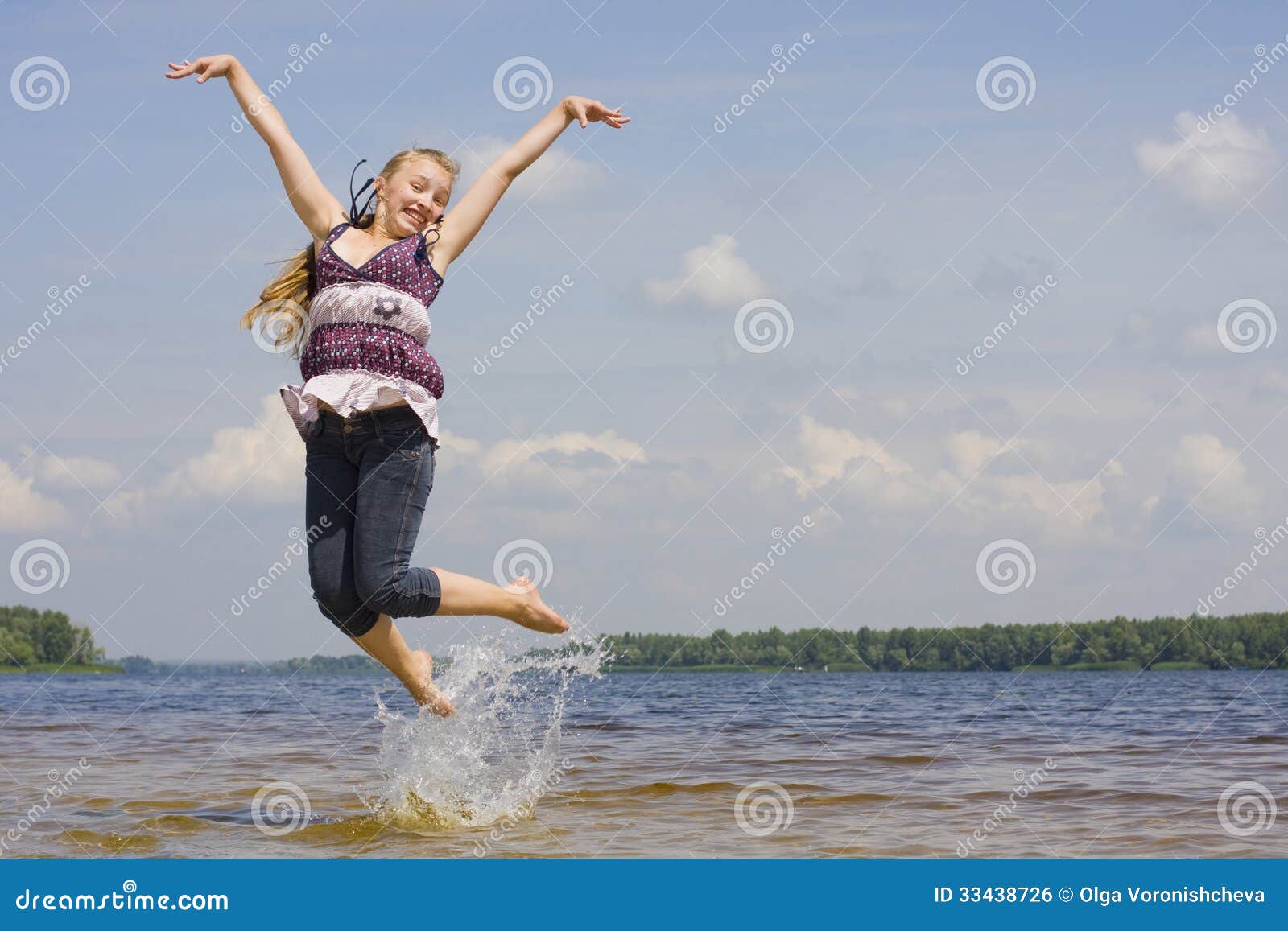 Girl jumping in water stock photo. Image of fashionable - 33438726