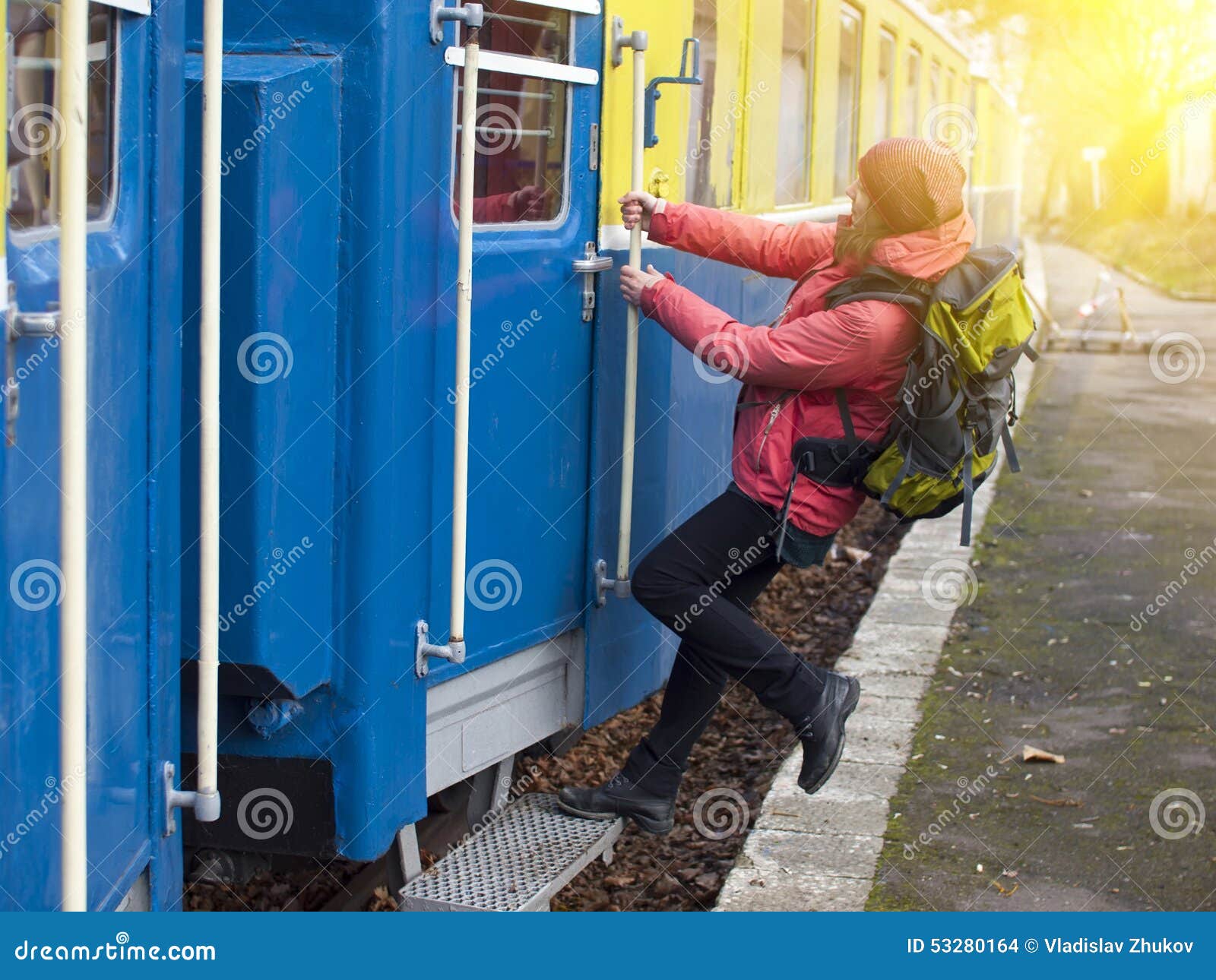 The Girl Jumps into the Train. Stock Photo - Image of sunset, entrance ...