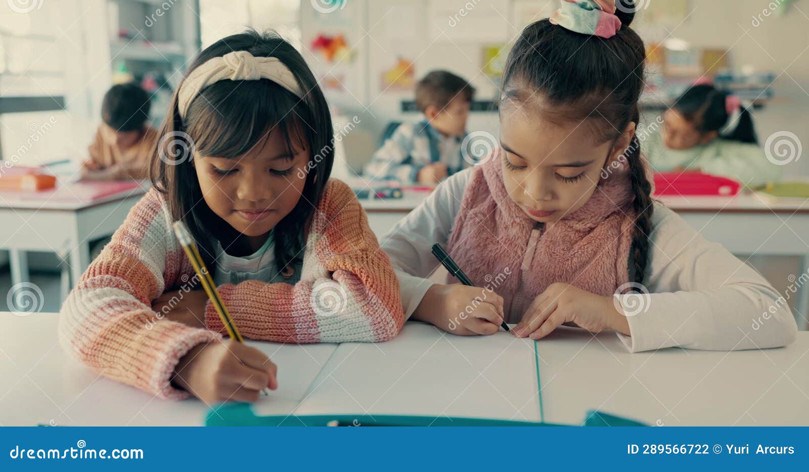 Girl Kids, Education and Students are Writing in Classroom with ...