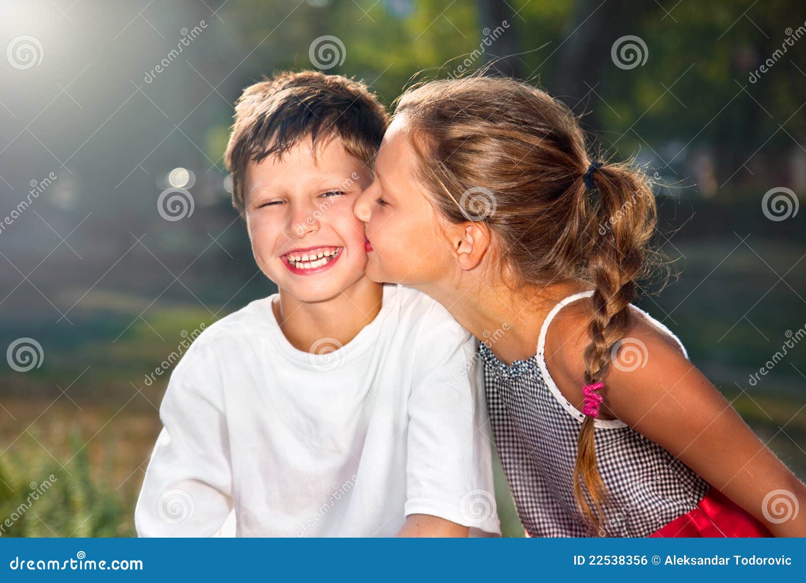 Girl kissing boy stock photo. Image of caucasian, kids - 22538356 Girl kissing boy stock photo. Image of caucasian, kids - 22538356