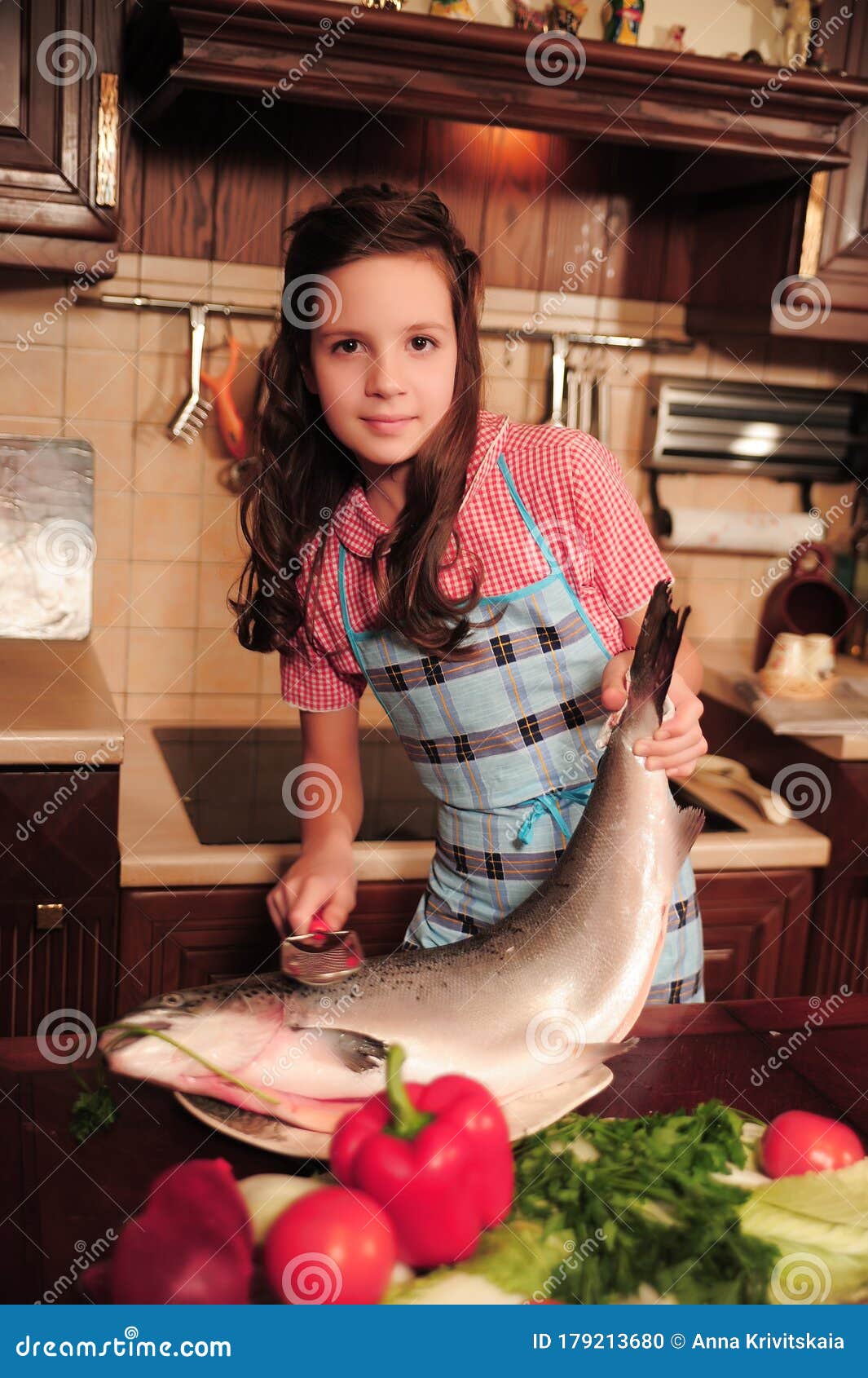 Girl in the Kitchen with Fish Stock Photo - Image of home, child: 179213680