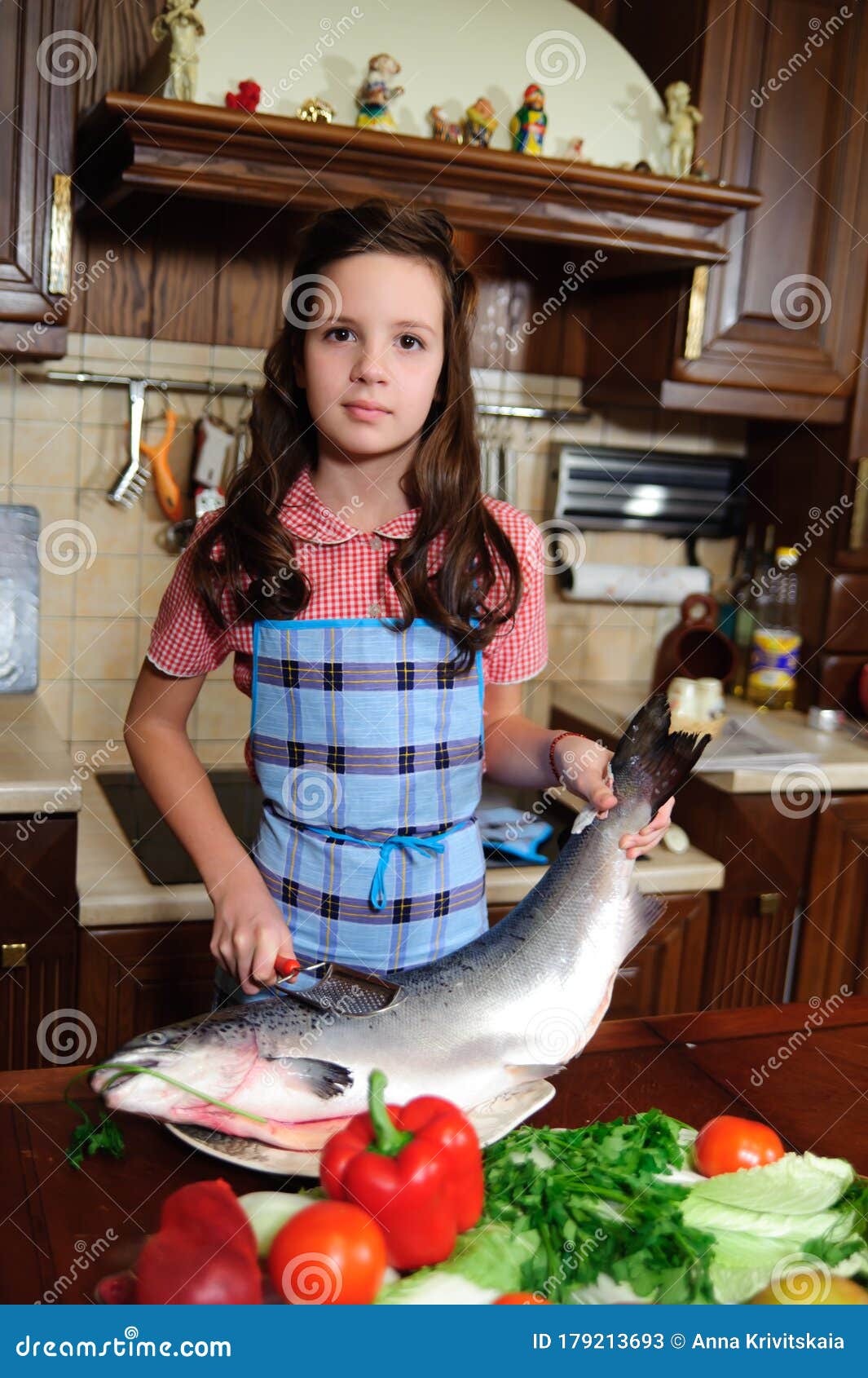Girl in the Kitchen with Fish Stock Image - Image of cute, cook: 179213693