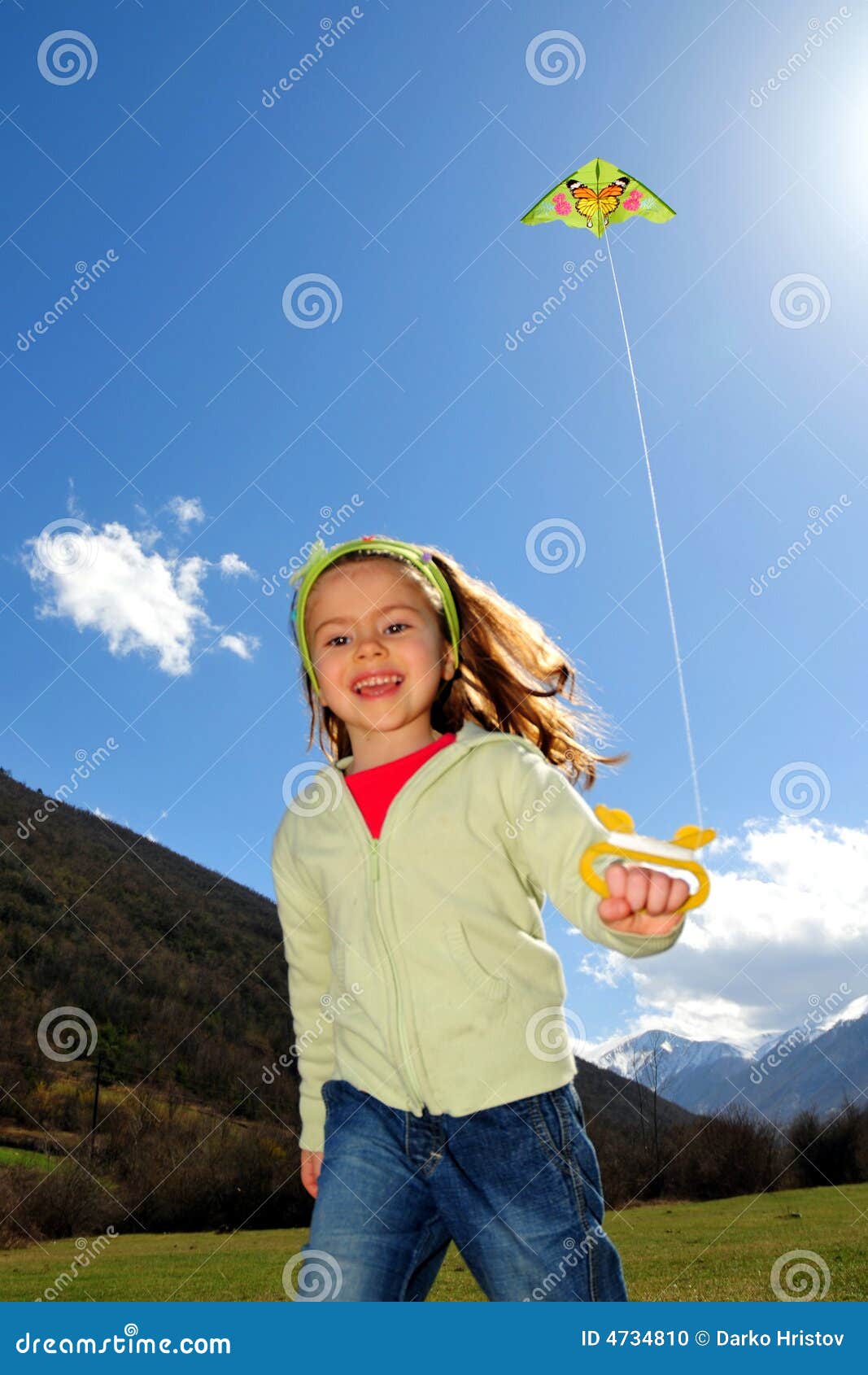 Girl and kite stock photo. Image of wind, cheerful, sunlit - 4734810