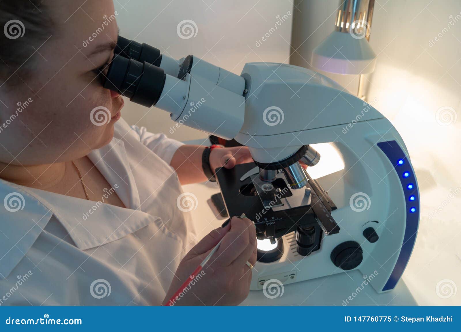The Girl in the Lab Works with a Microscope Editorial Image - Image of ...