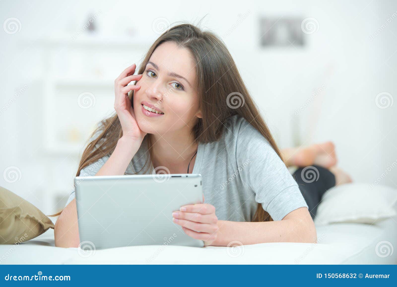 Girl Laid on Bed Using Notepad Computer Stock Photo - Image of cosy ...