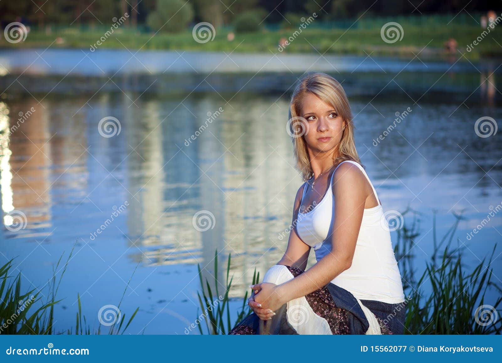 Girl by the Lake stock image. Image of happy, flowers - 15562077