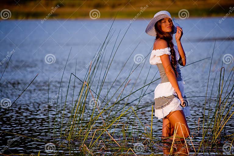 Girl in lake stock photo. Image of scene, evening, nature - 6204592