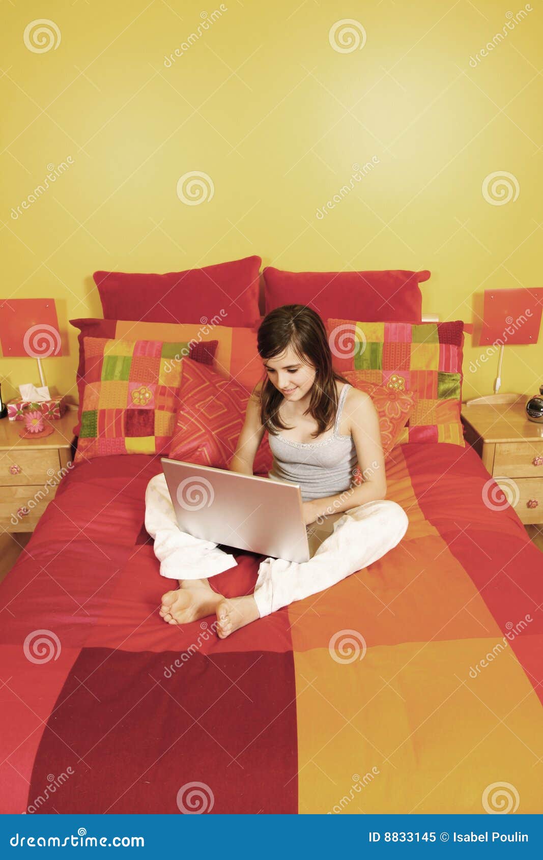 Girl with laptop in bed stock image. Image of internet - 8833145
