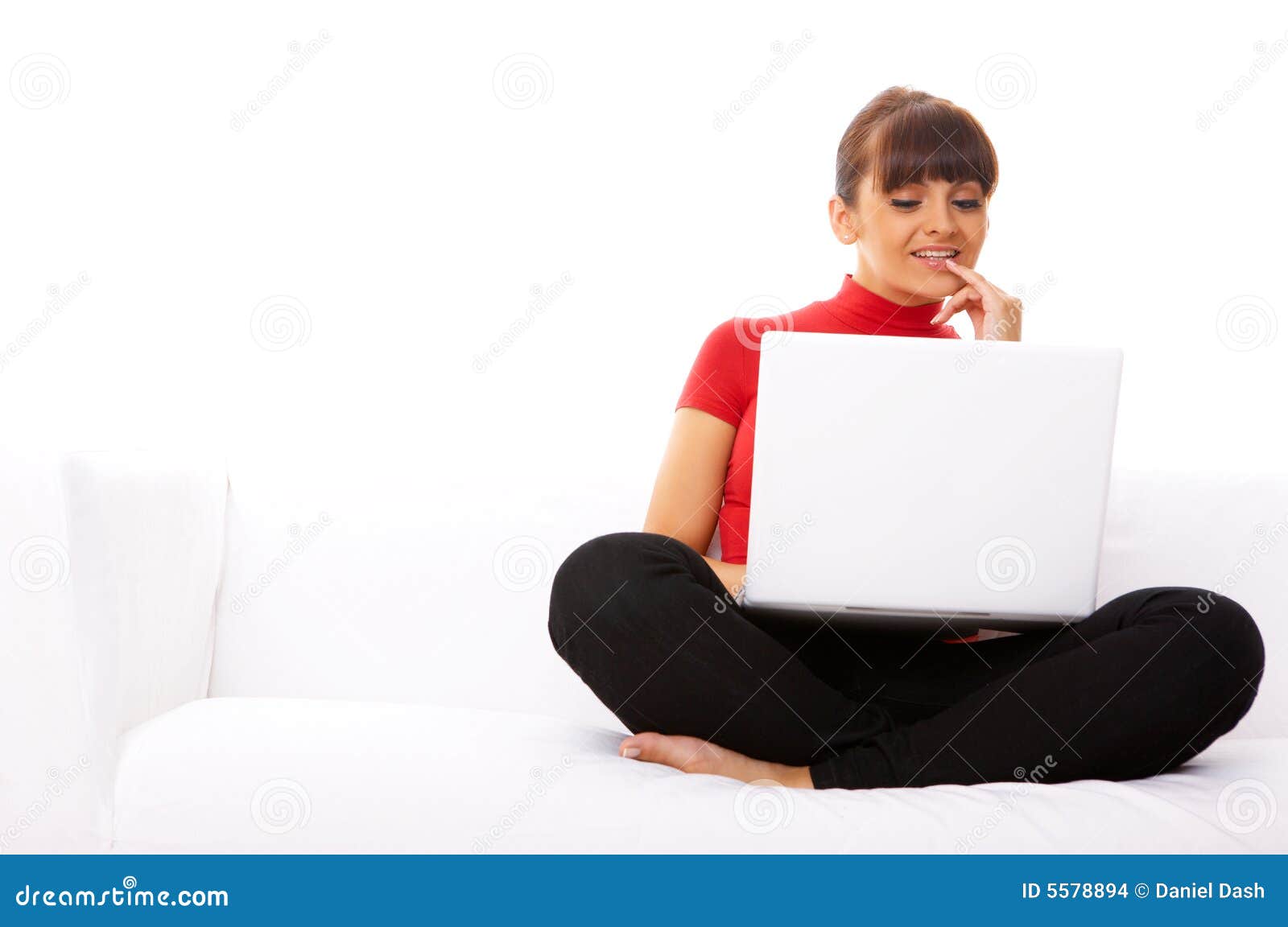 Girl with laptop on couch stock photo. Image of pleasure - 5578894