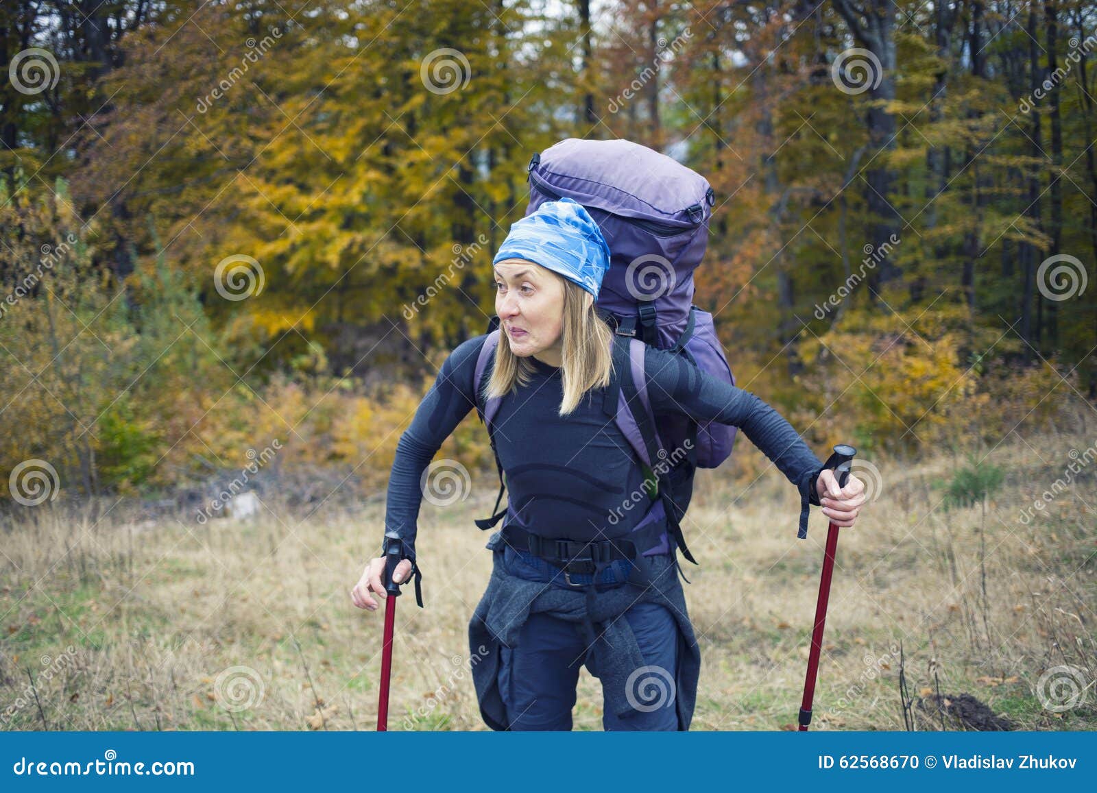 Girl with a Large Backpack. Stock Photo - Image of femininity ...