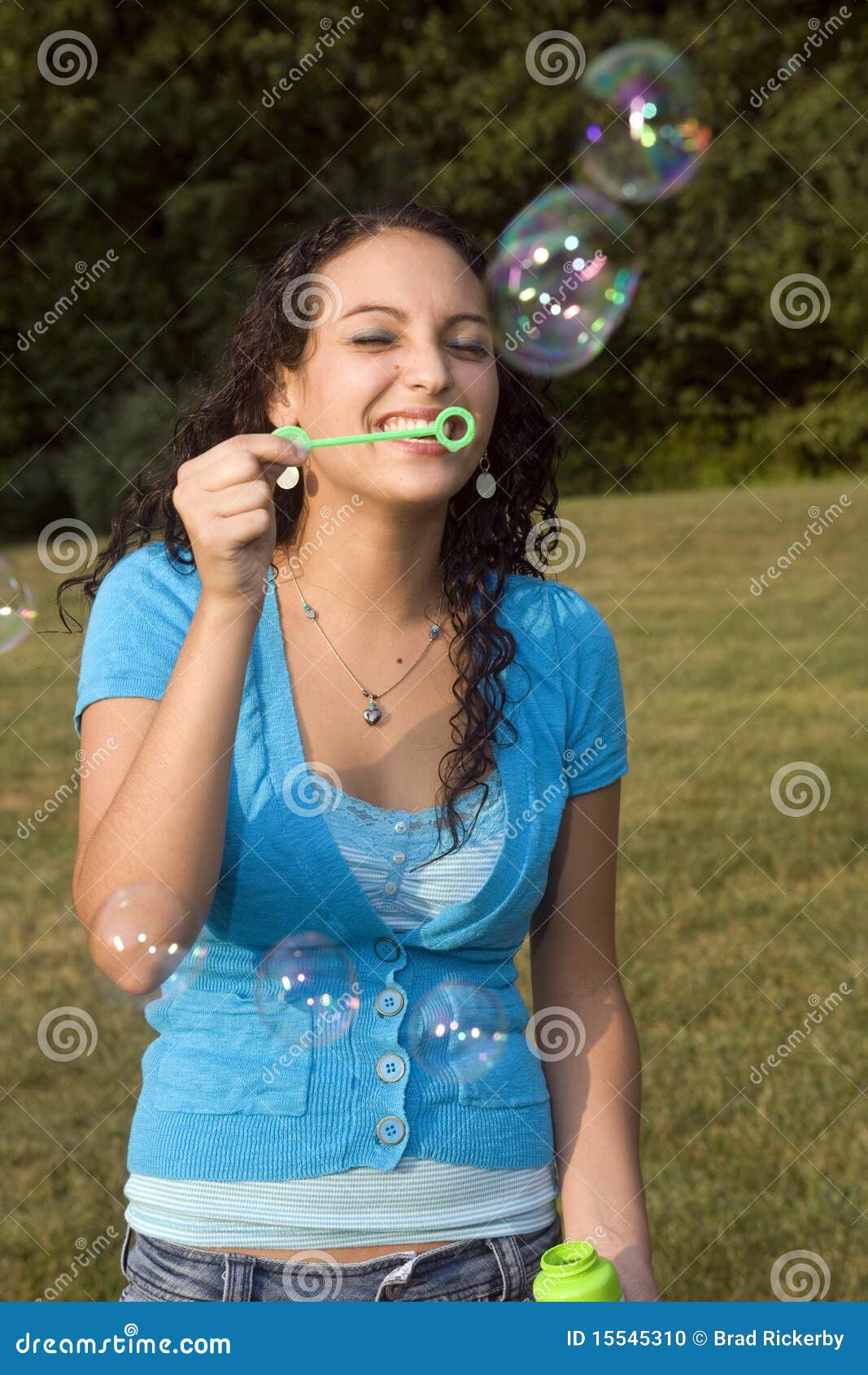 Girl Laughs at Blowing Bubbles Stock Photo - Image of nature, afternoon ...
