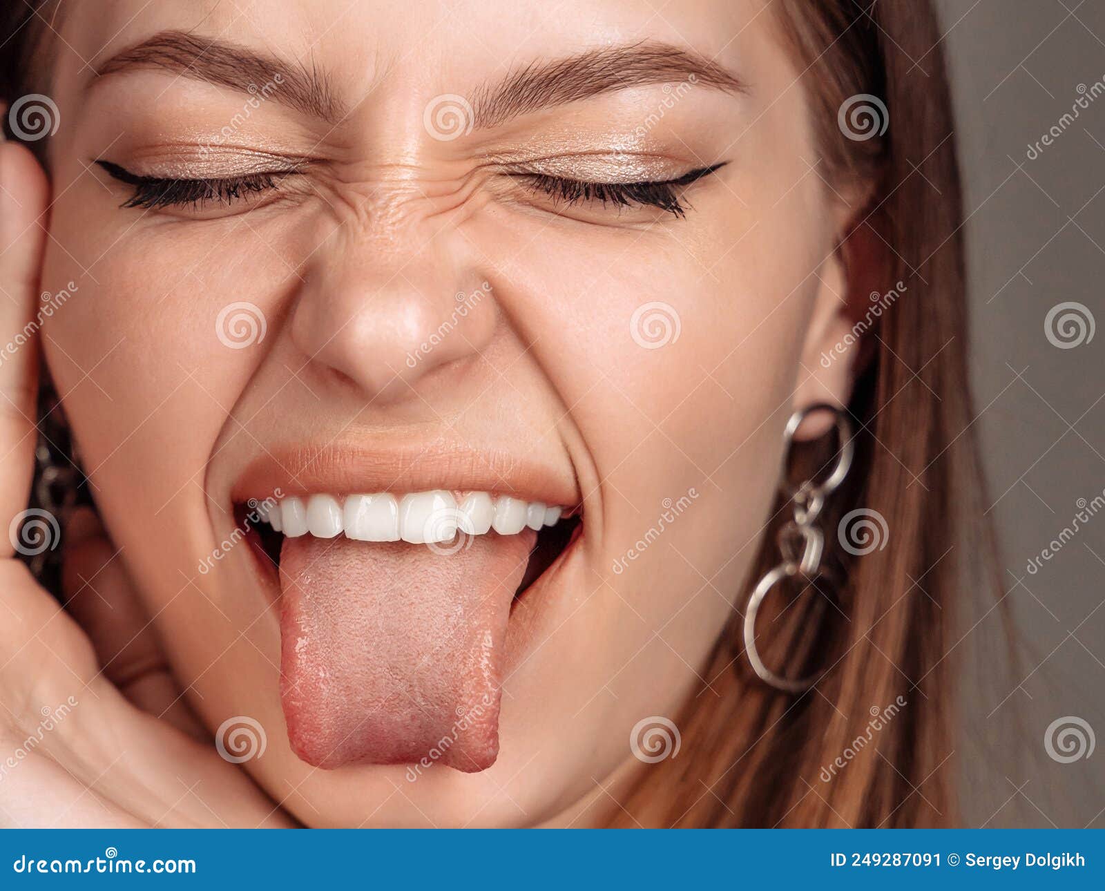 Girl Laughs Close Up Of The Face Woman Show Tongue Portrait With Open