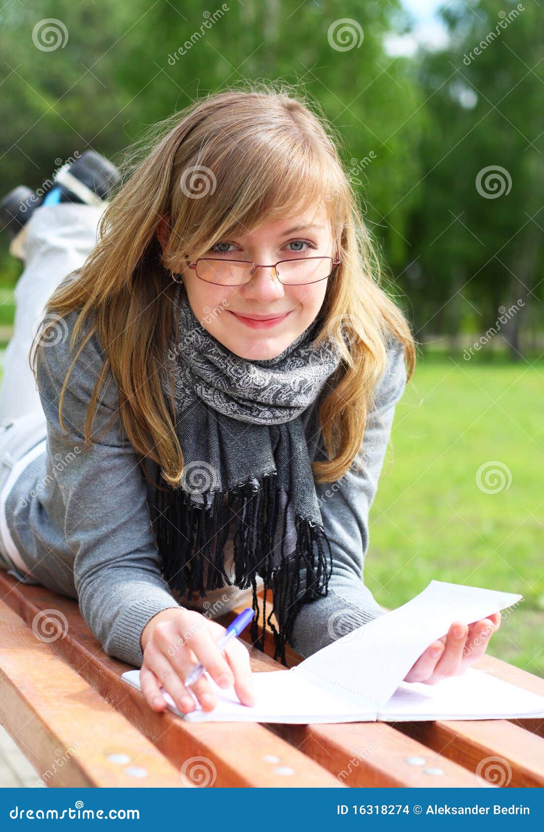 The Girl Lay on a Bench, and Write Stock Photo - Image of college, body ...