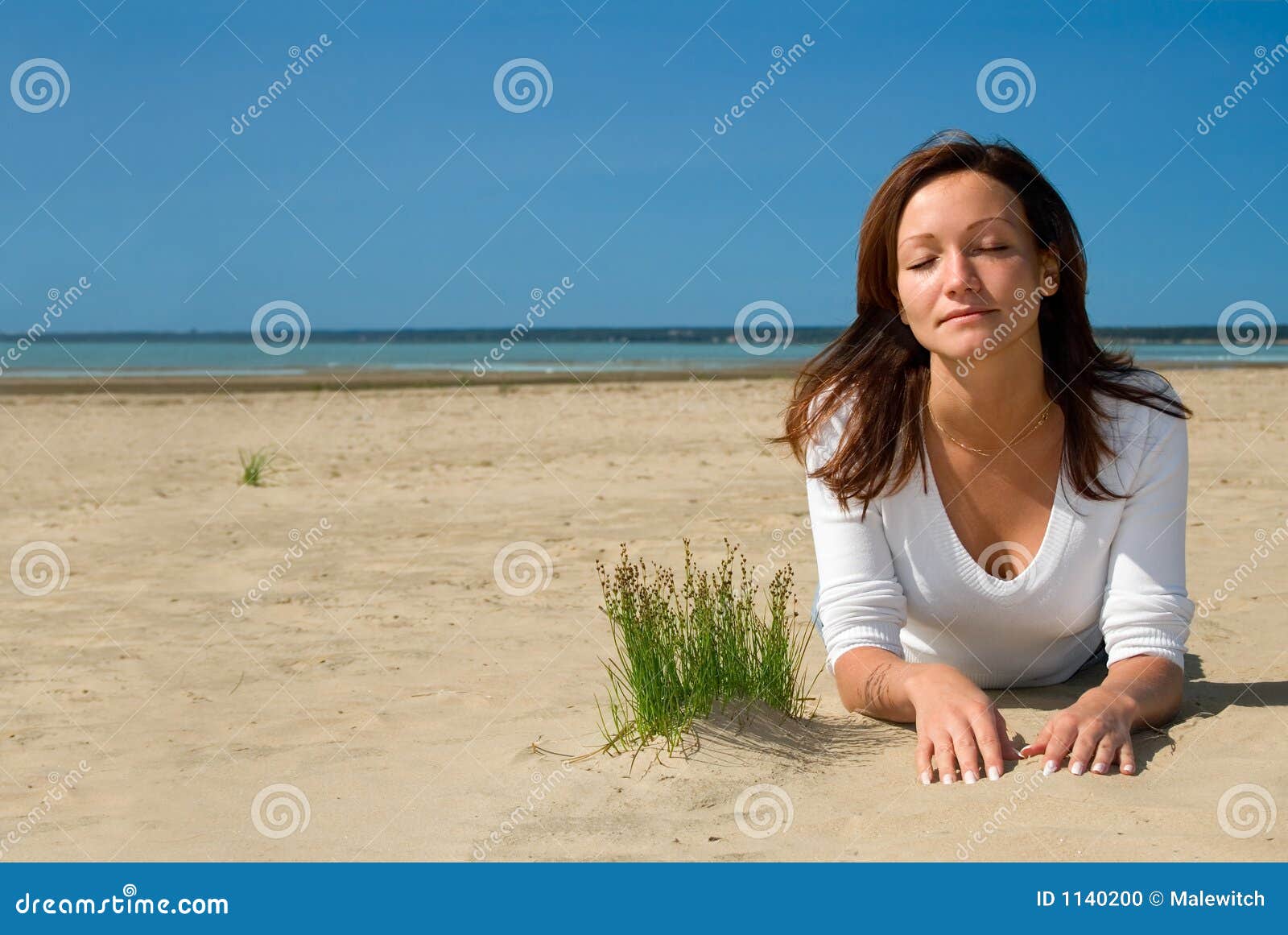 Girl laying on a beach-5 stock photo. Image of lifestyle - 1140200