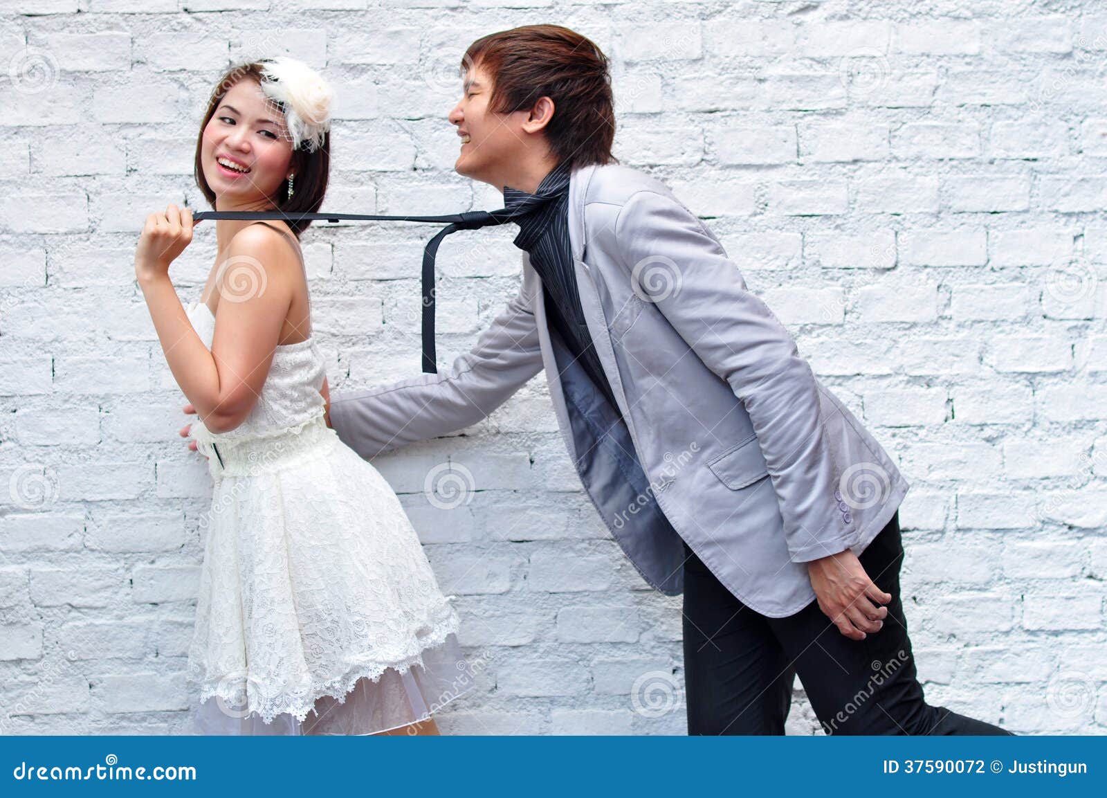 A girl lead a man stock photo. Image of businessman, home - 37590072