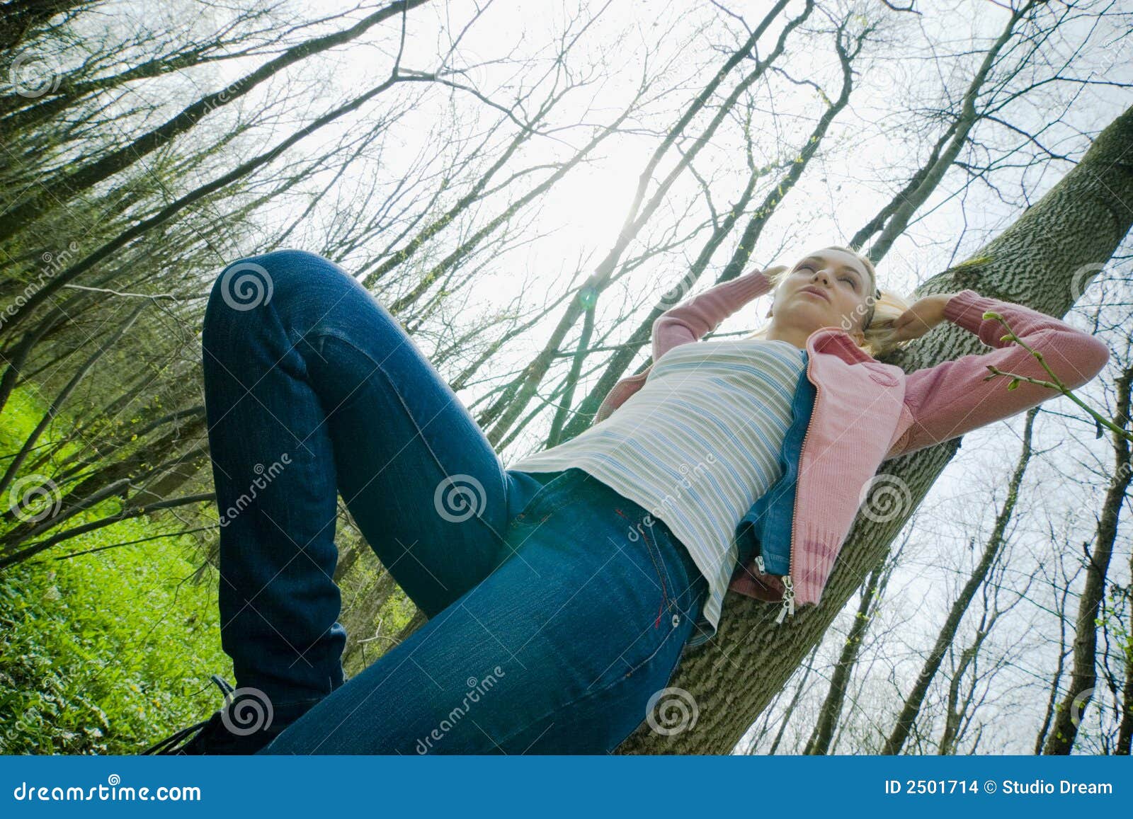 Girl Leaning Against a Tree Stock Photo - Image of daydream, casual ...