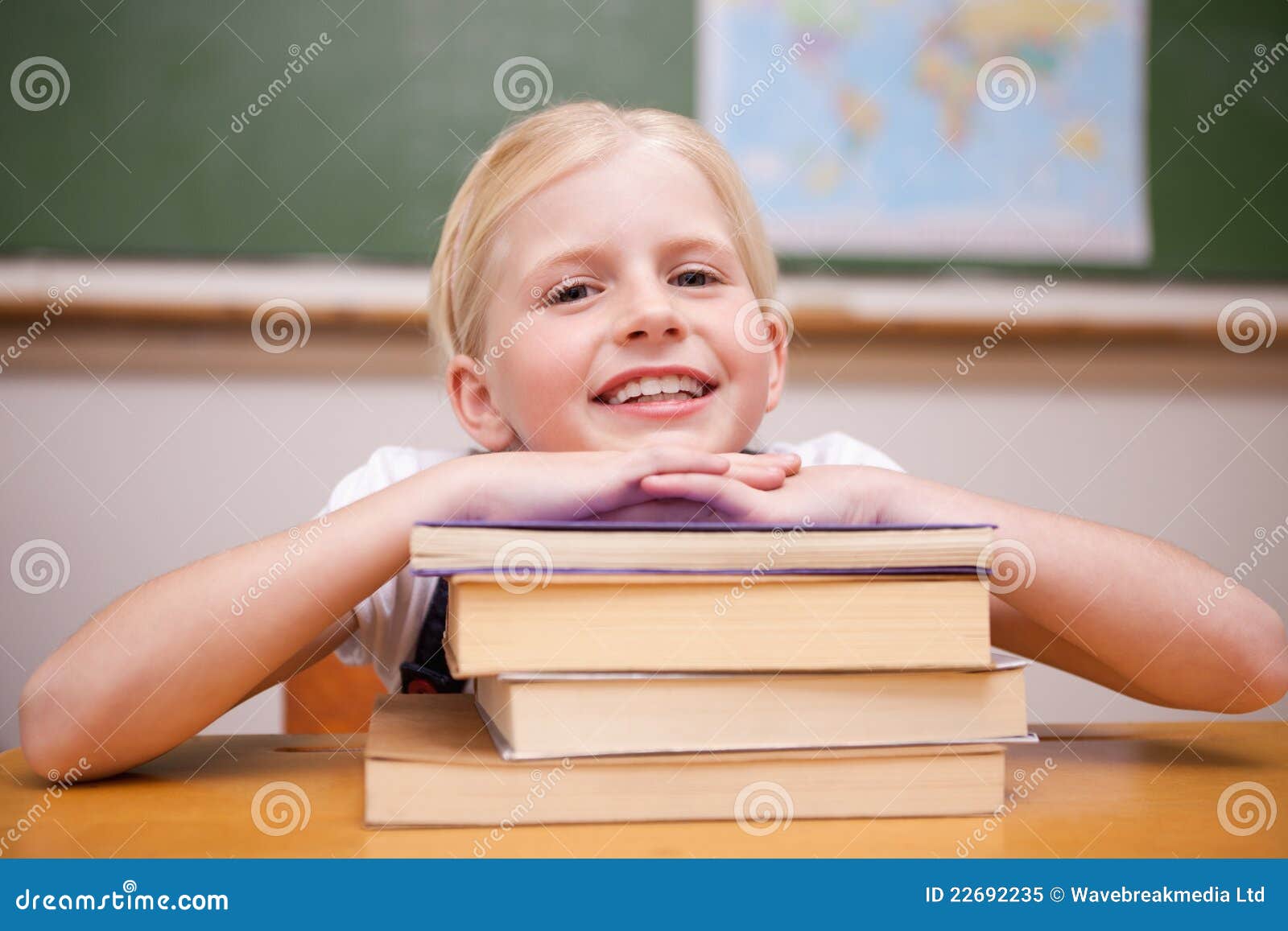 Girl leaning on books stock image. Image of learn, elementary - 22692235