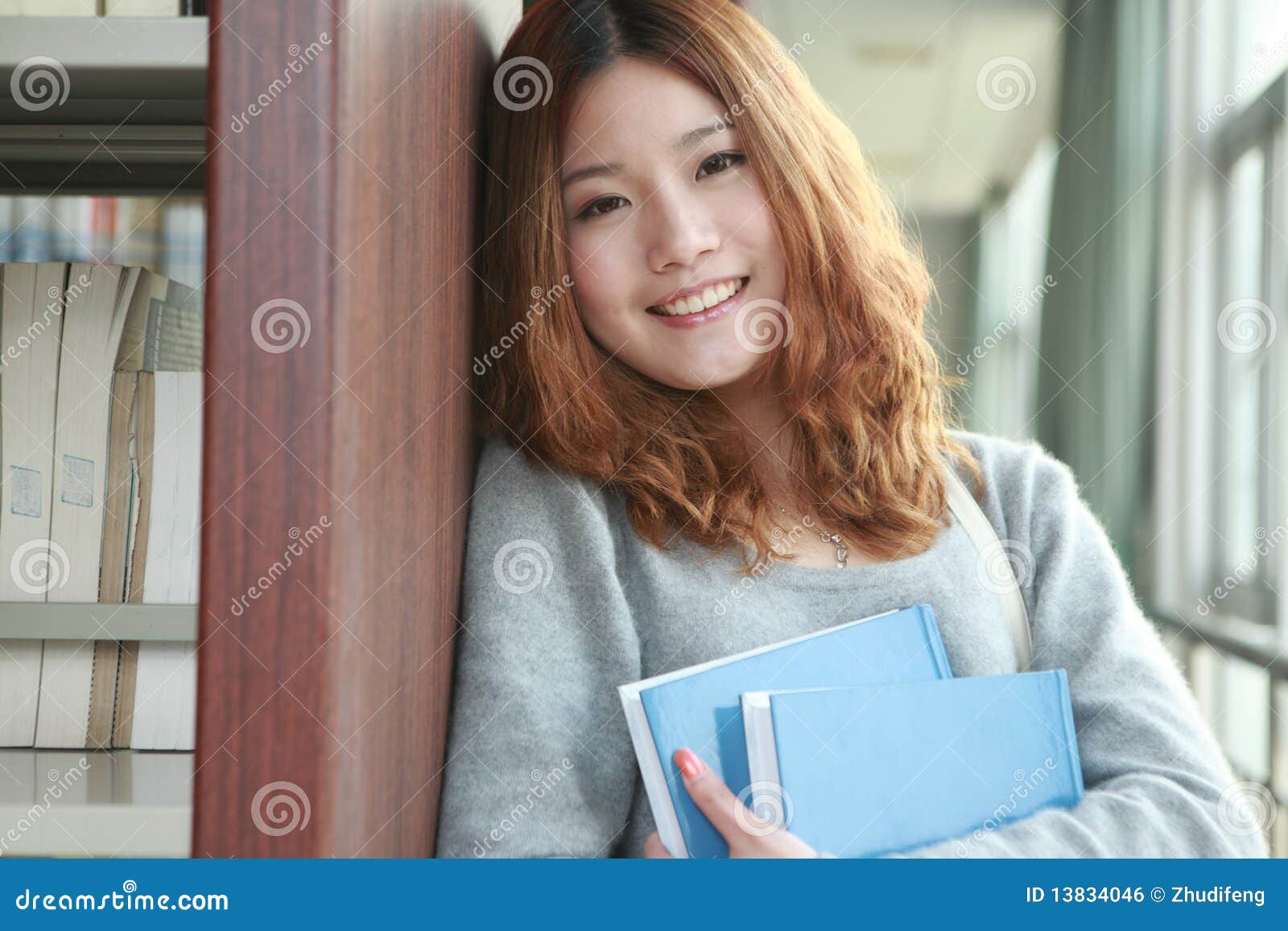 Girl in library stock photo. Image of bookshelf, pretty - 13834046