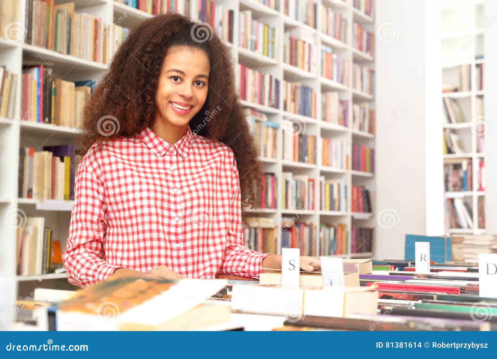 The girl in the library. stock photo. Image of bookcase - 81381614 The girl in the library. stock photo. Image of bookcase - 81381614