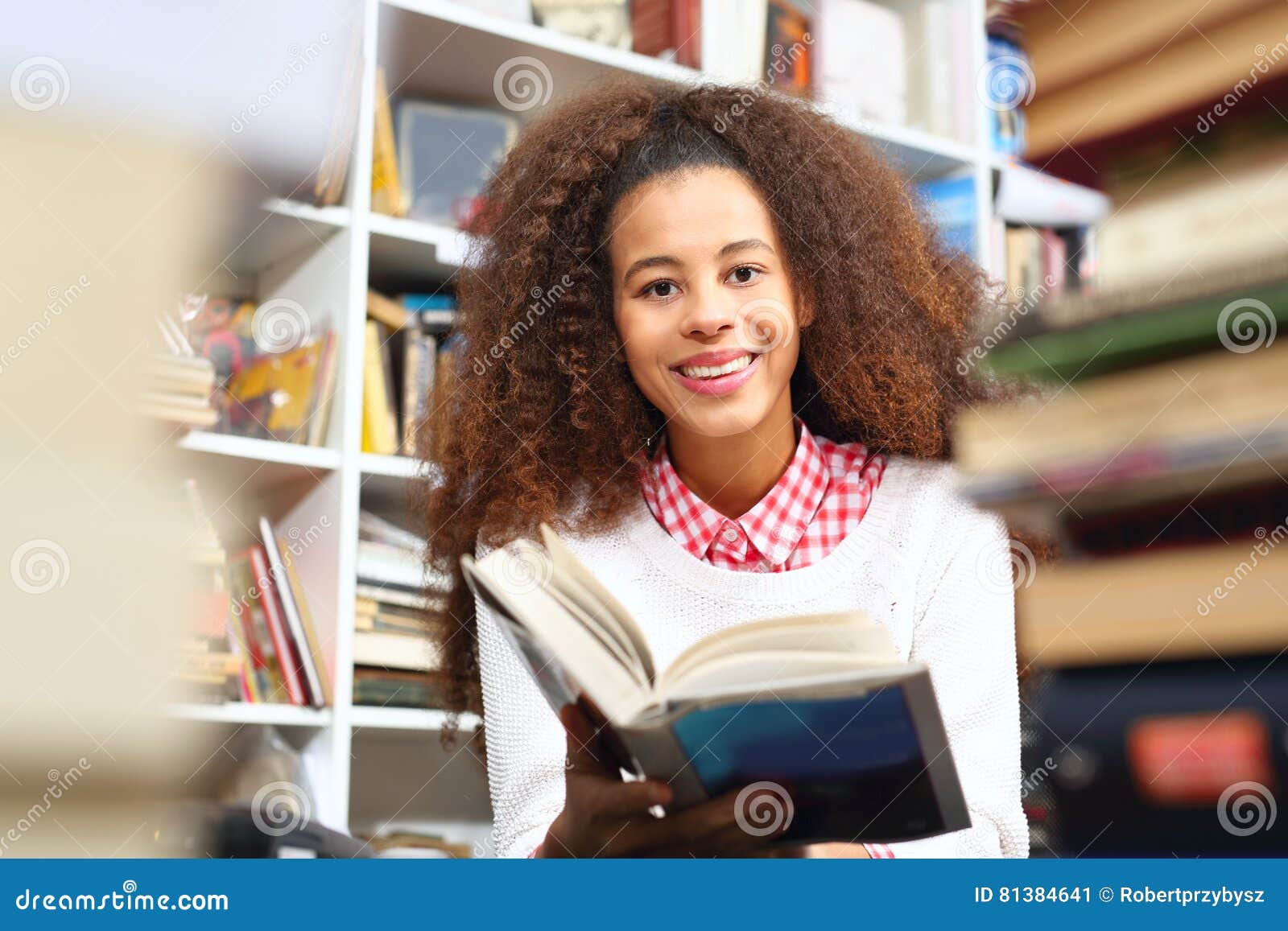 Girl in the library. stock image. Image of shopping, exam - 81384641