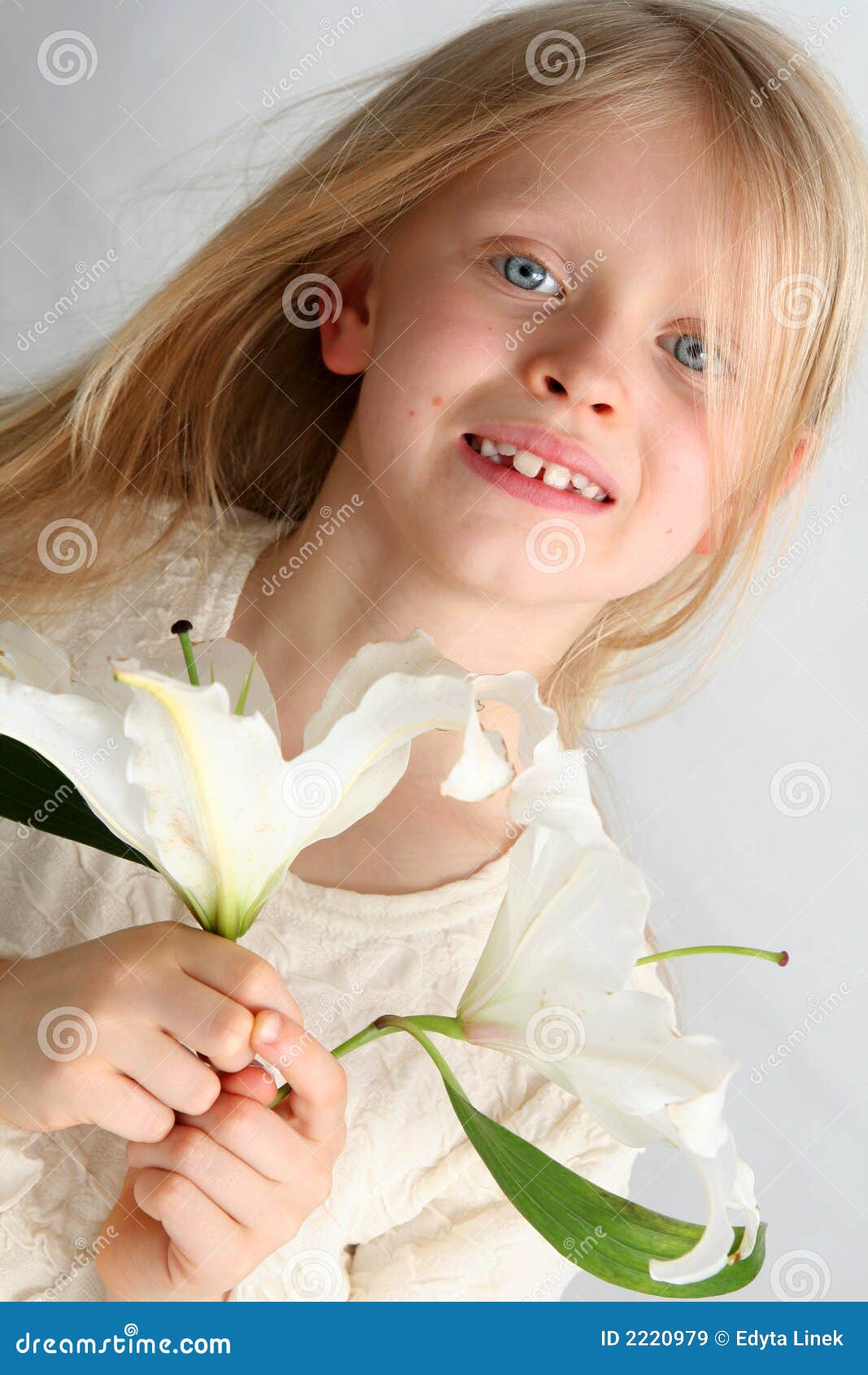 Girl And Lilies Royalty-Free Stock Photography | CartoonDealer.com #2221043