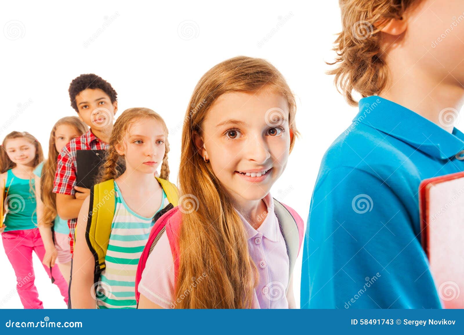 Girl in the Line Smiling among Other Students Stock Image - Image of ...