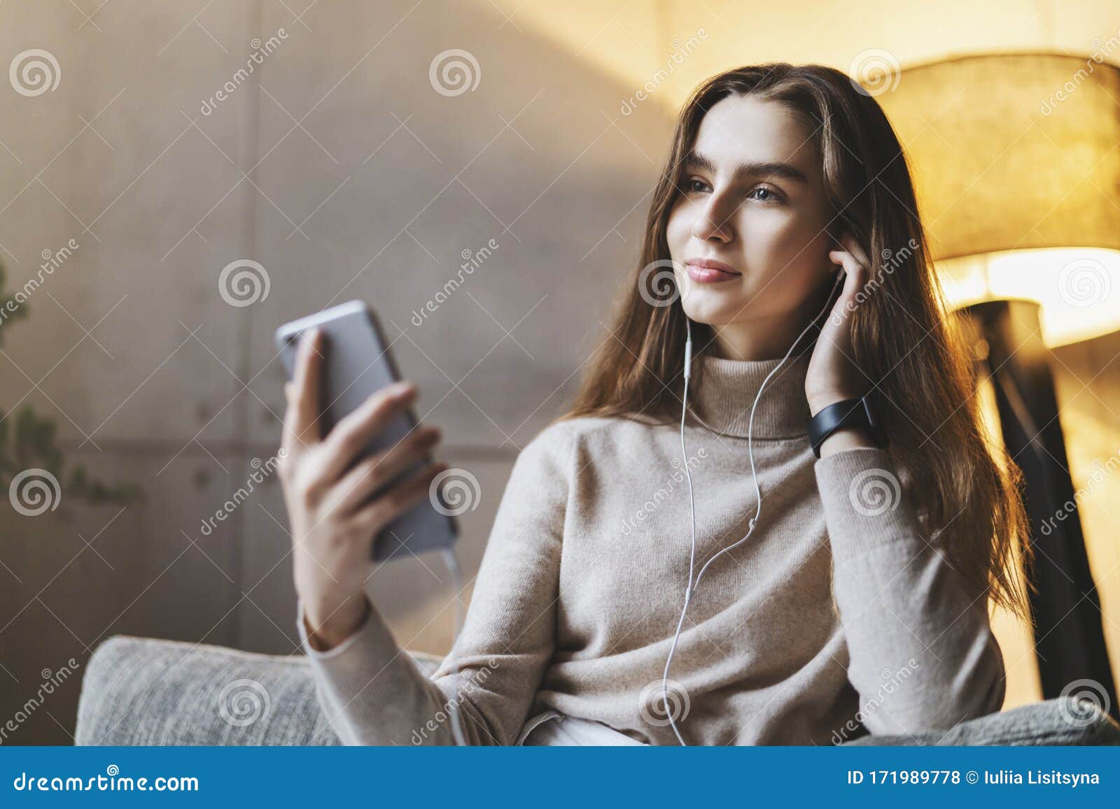 Girl Listening To Music In Earphones Young Woman Downloading Favorite