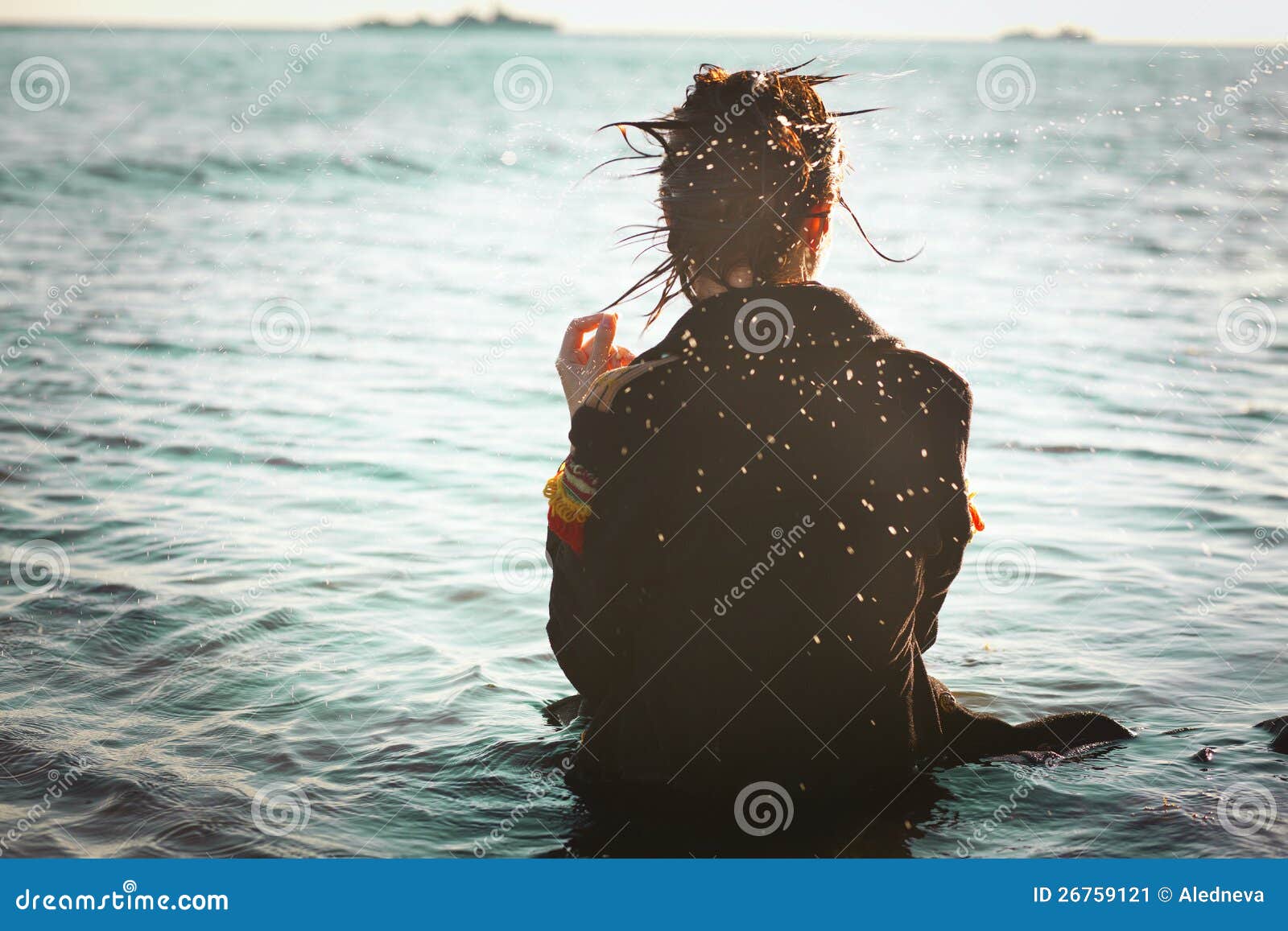 Girl lonely in the sea stock image. Image of coastline - 26759121