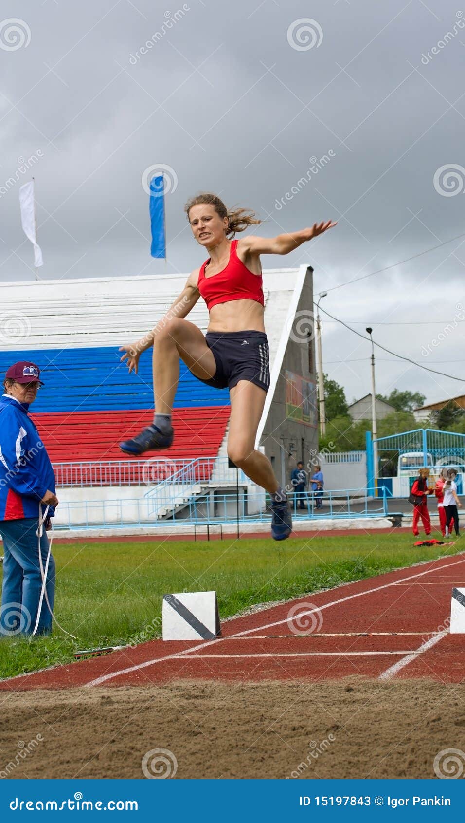 Girl long jumps editorial stock photo. Image of blocks - 15197843