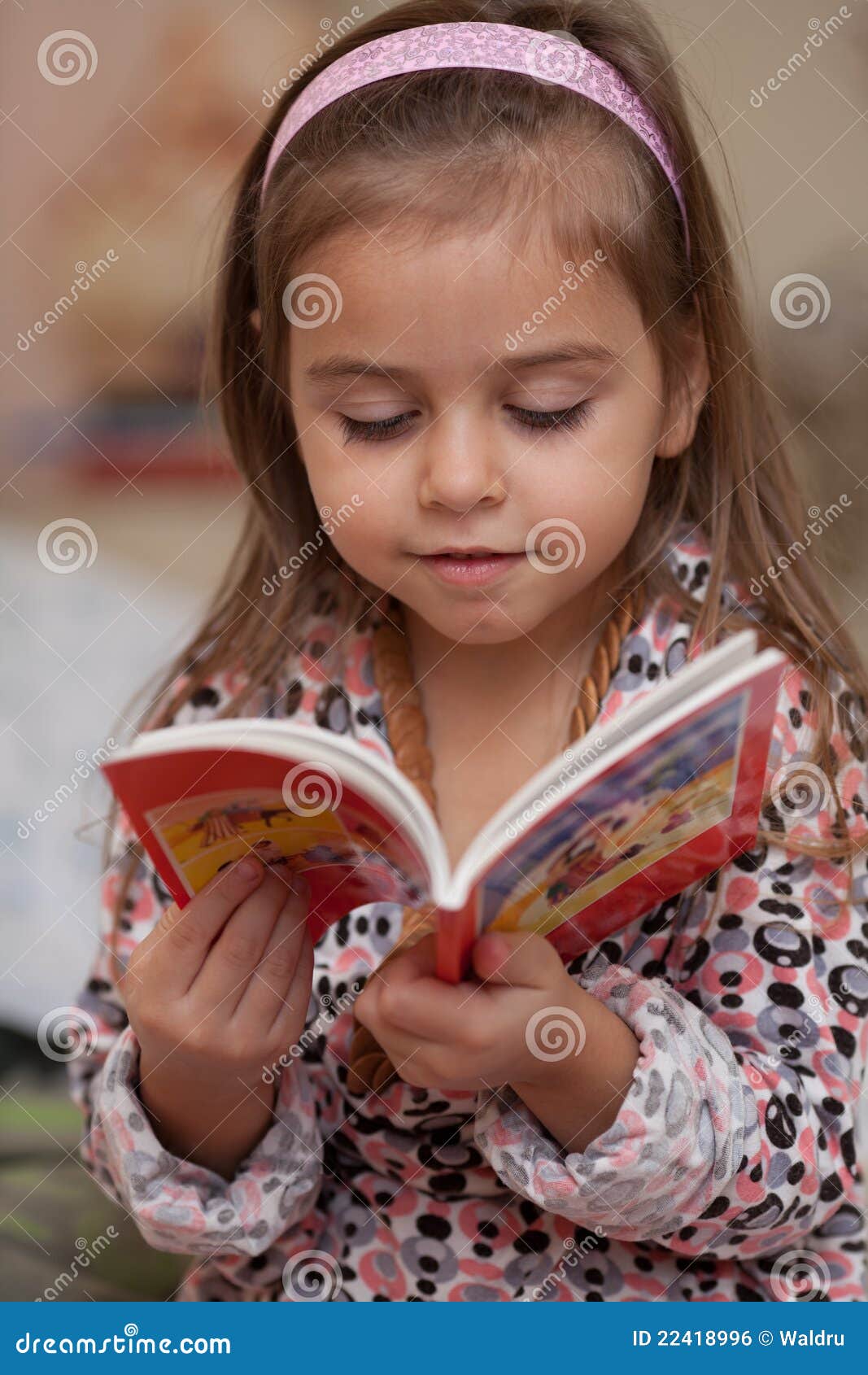 Girl looking at book stock photo. Image of portrait, necklace - 22418996