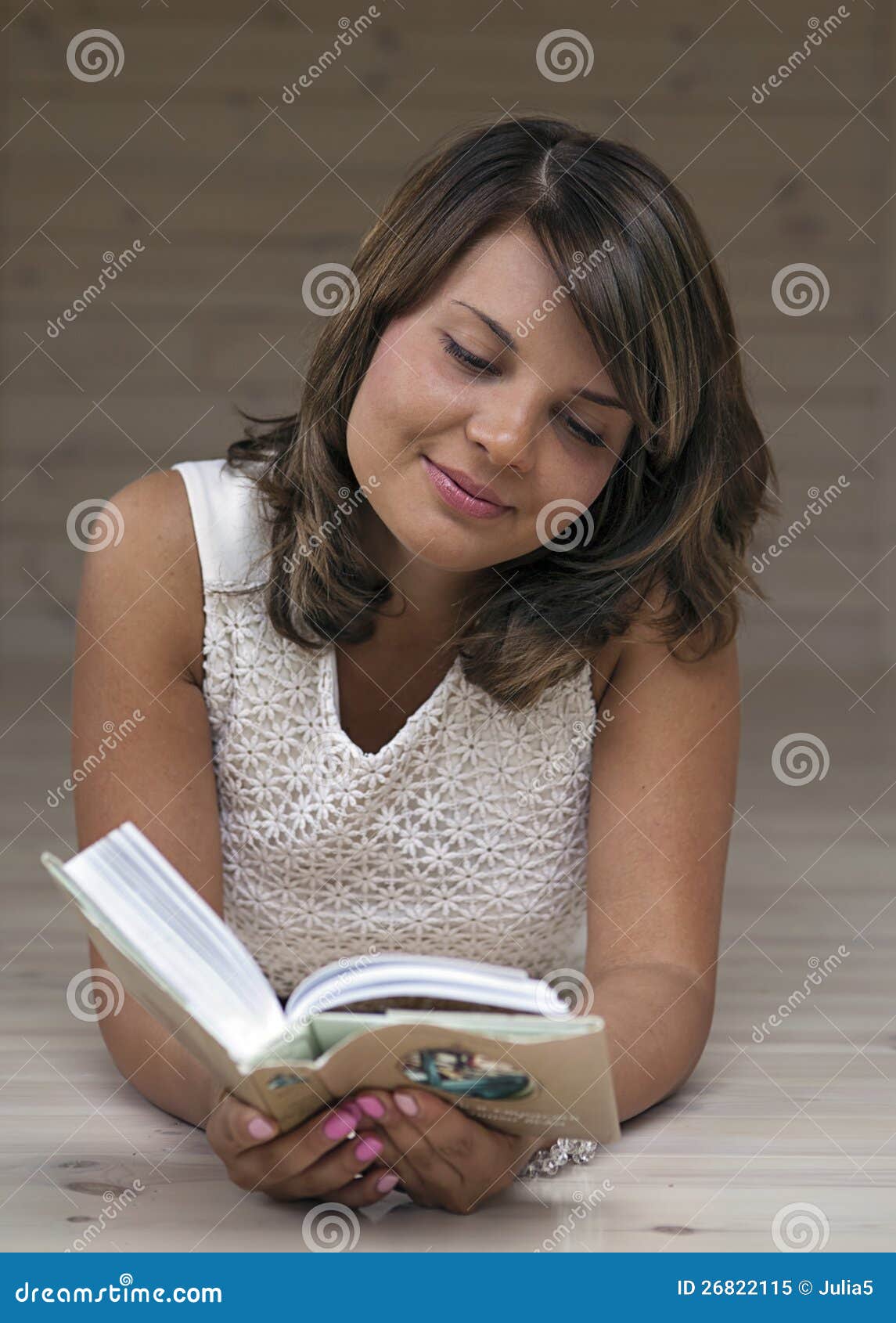 Girl looking into a book stock image. Image of culture - 26822115