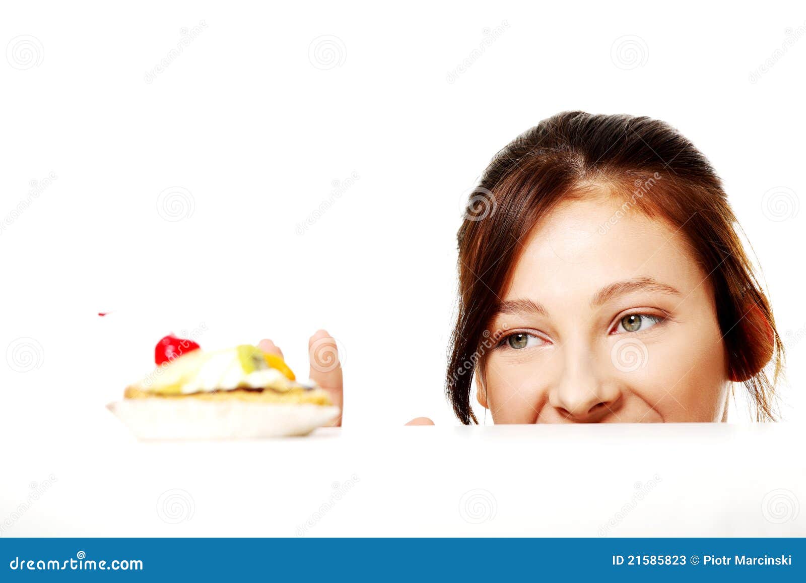 Girl looking at the cake. stock image. Image of isolated - 21585823