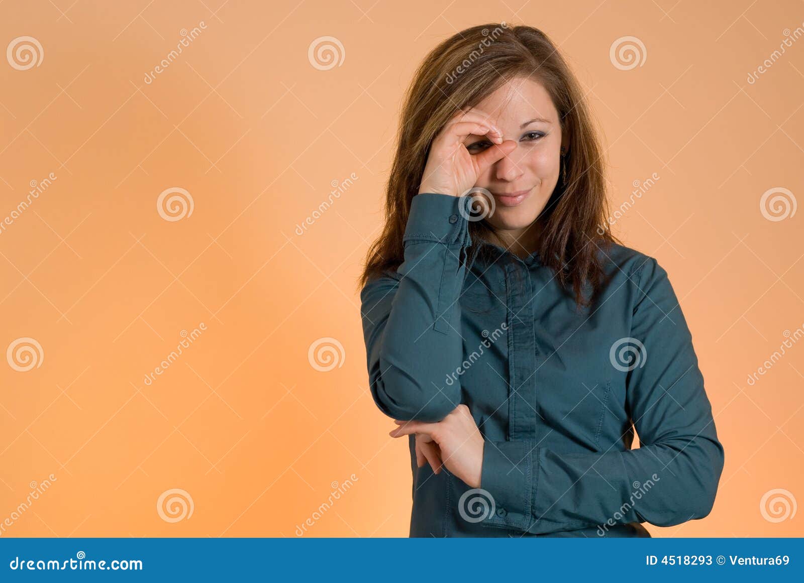 Girl looking through hand stock image. Image of elegant - 4518293