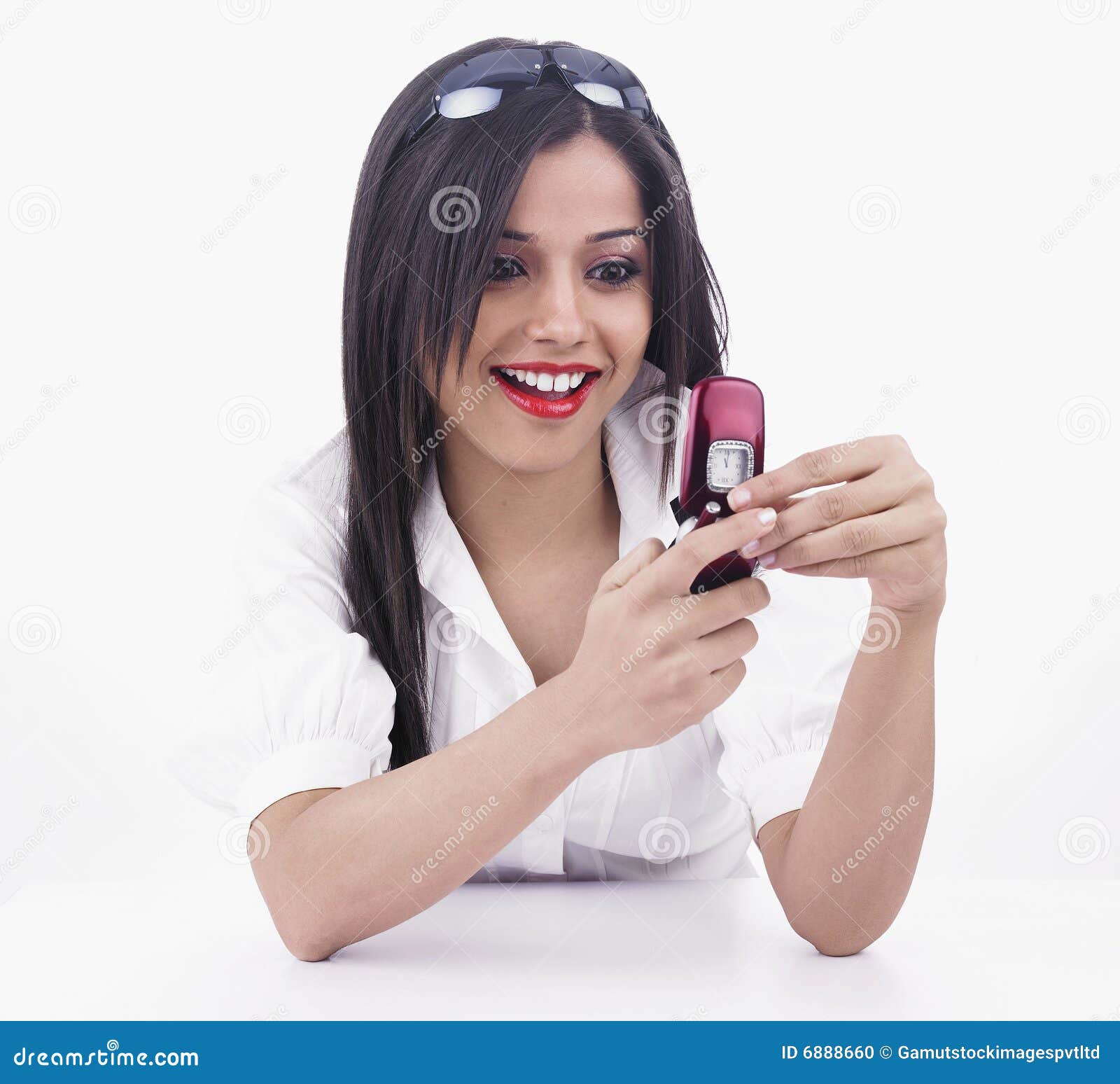 Girl Looking at Her Cell Phone Stock Photo - Image of attractive, hair ...