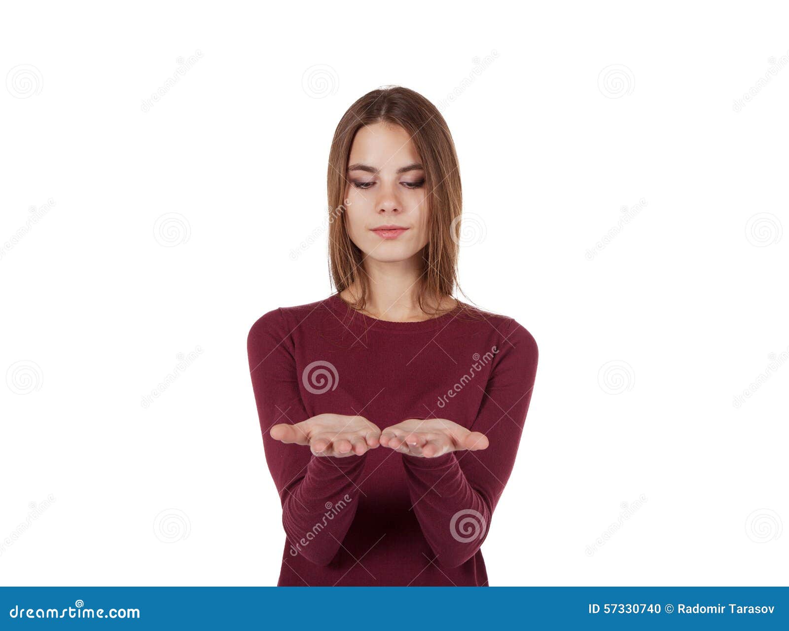 Girl looking at her hands stock photo. Image of cute - 57330740