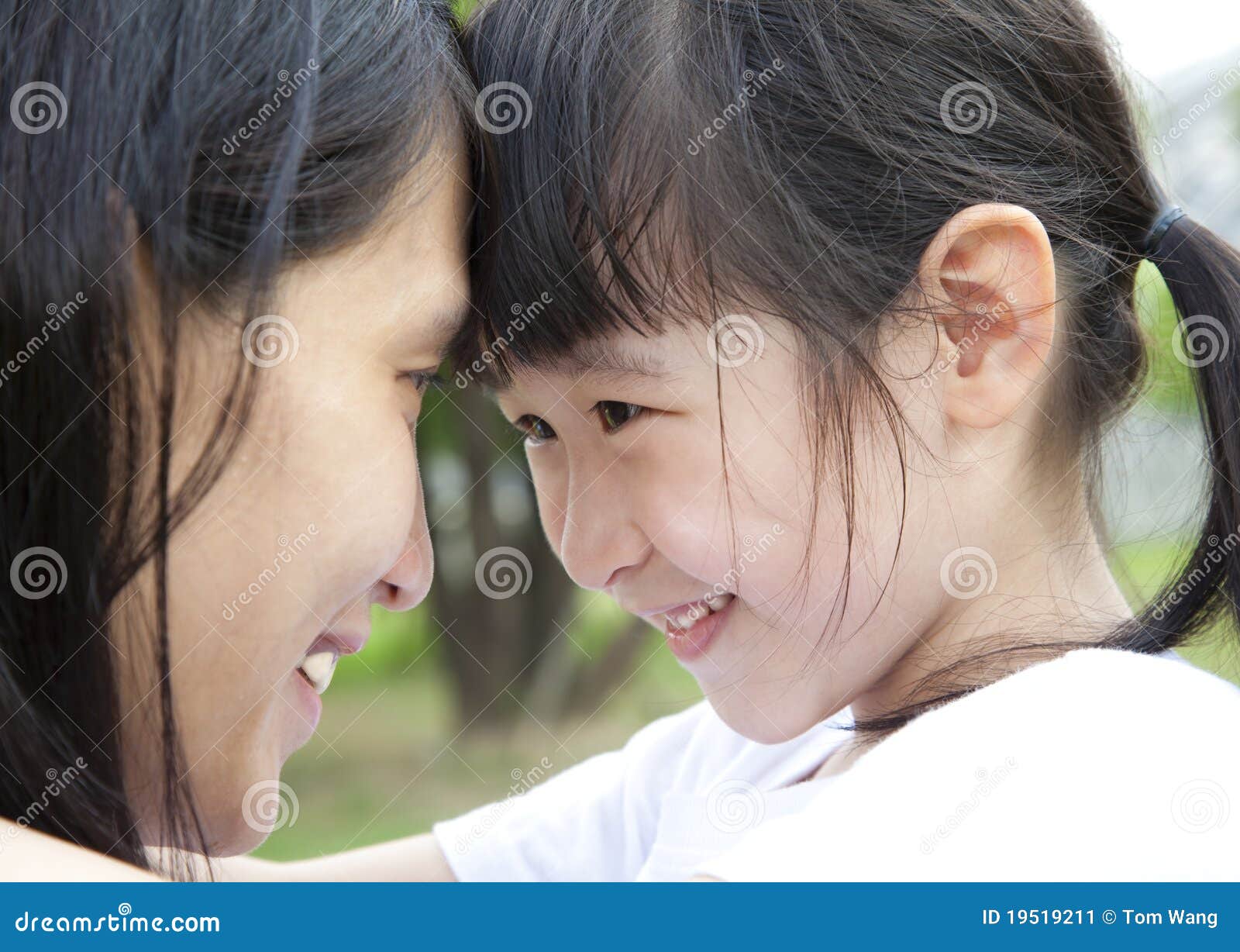 Girl looking her mother stock image. Image of love, living - 19519211